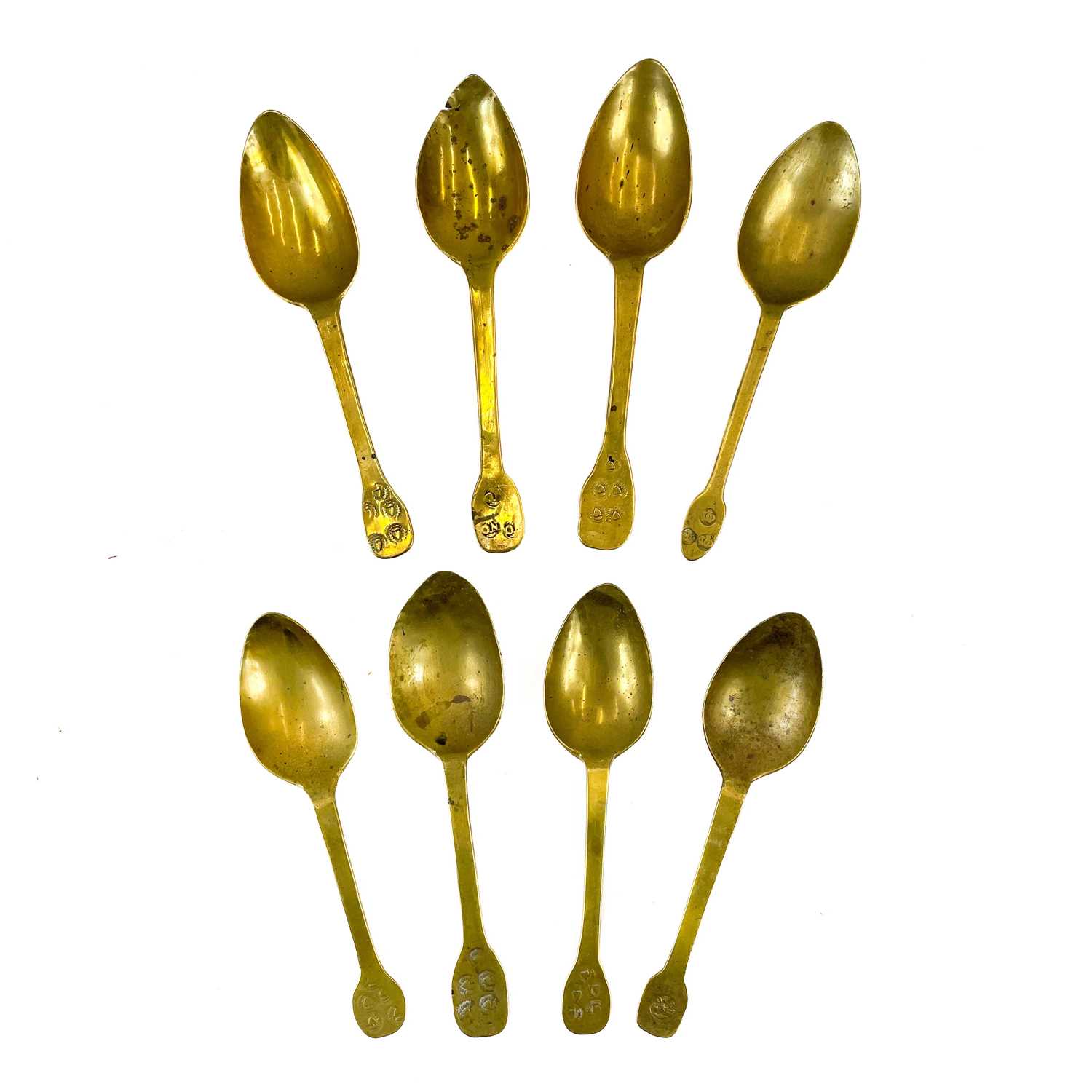Lot 136 - A group of eight French brass spoons.