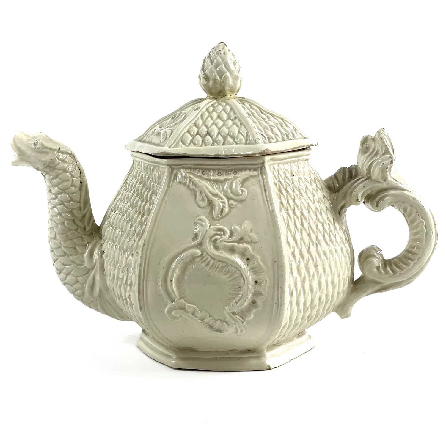 Lot 74 - An early creamware teapot.