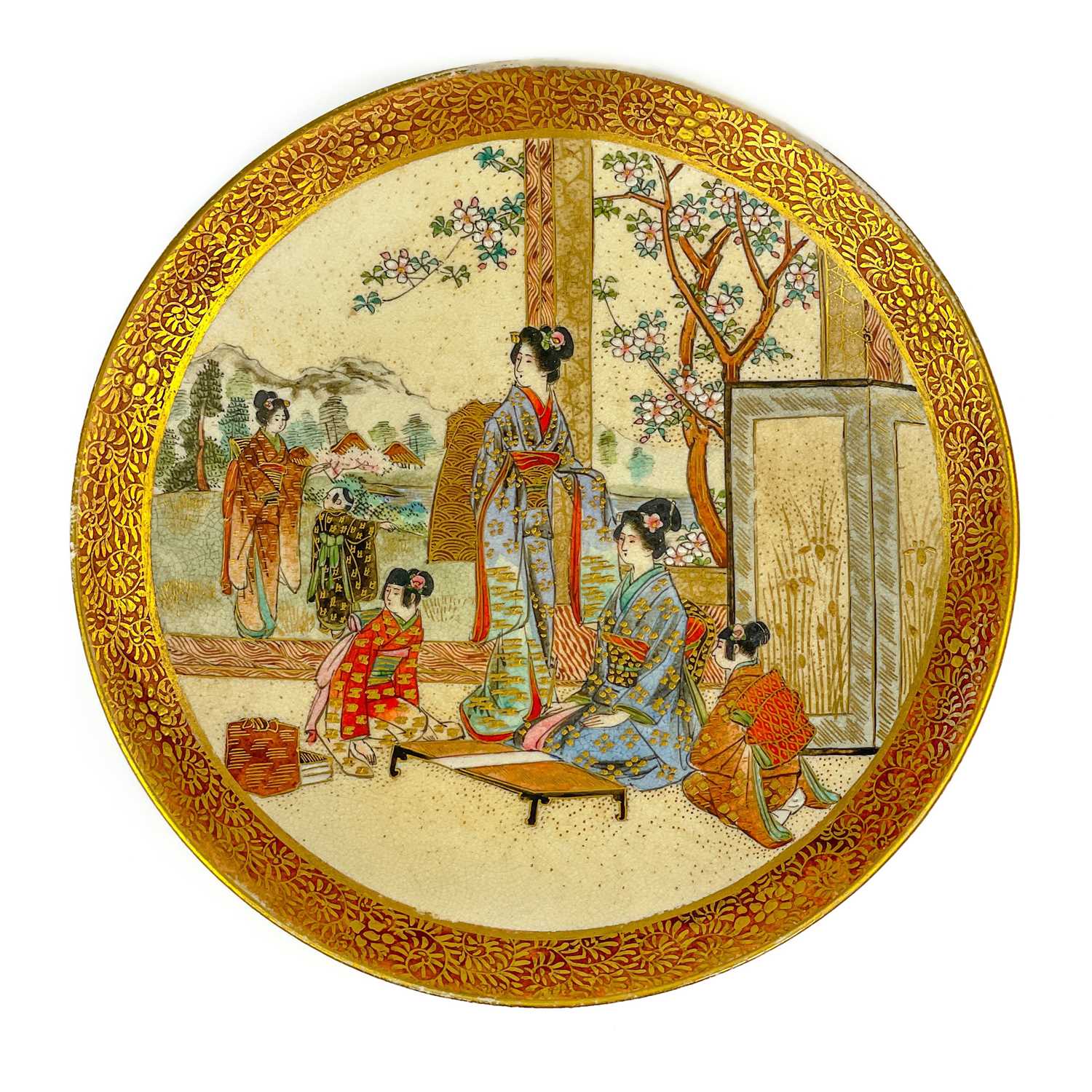 Lot 233 - A Japanese Satsuma pottery circular dish,