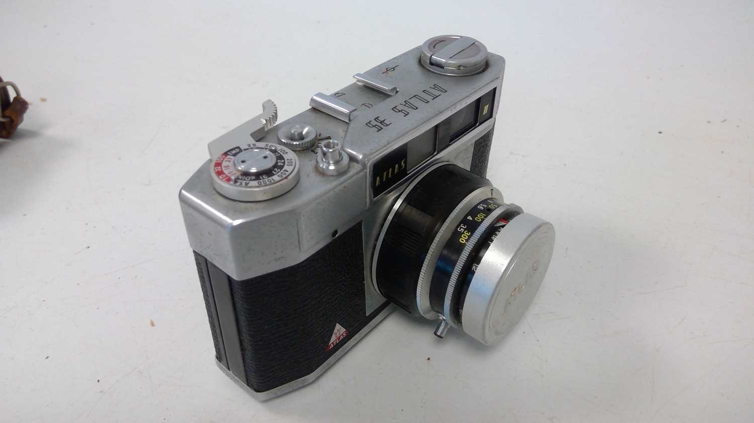 Lot 76 - Atlas 35 film camera in leather case, the