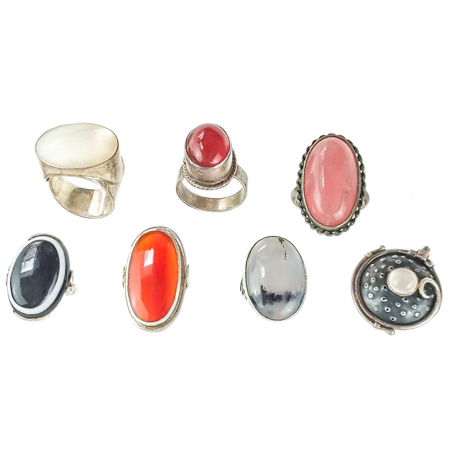 Lot 526 - Seven silver stone set rings