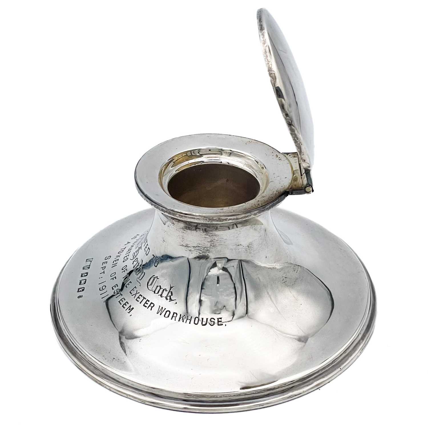 Lot 45 - An Edwardian silver capstan inkwell.