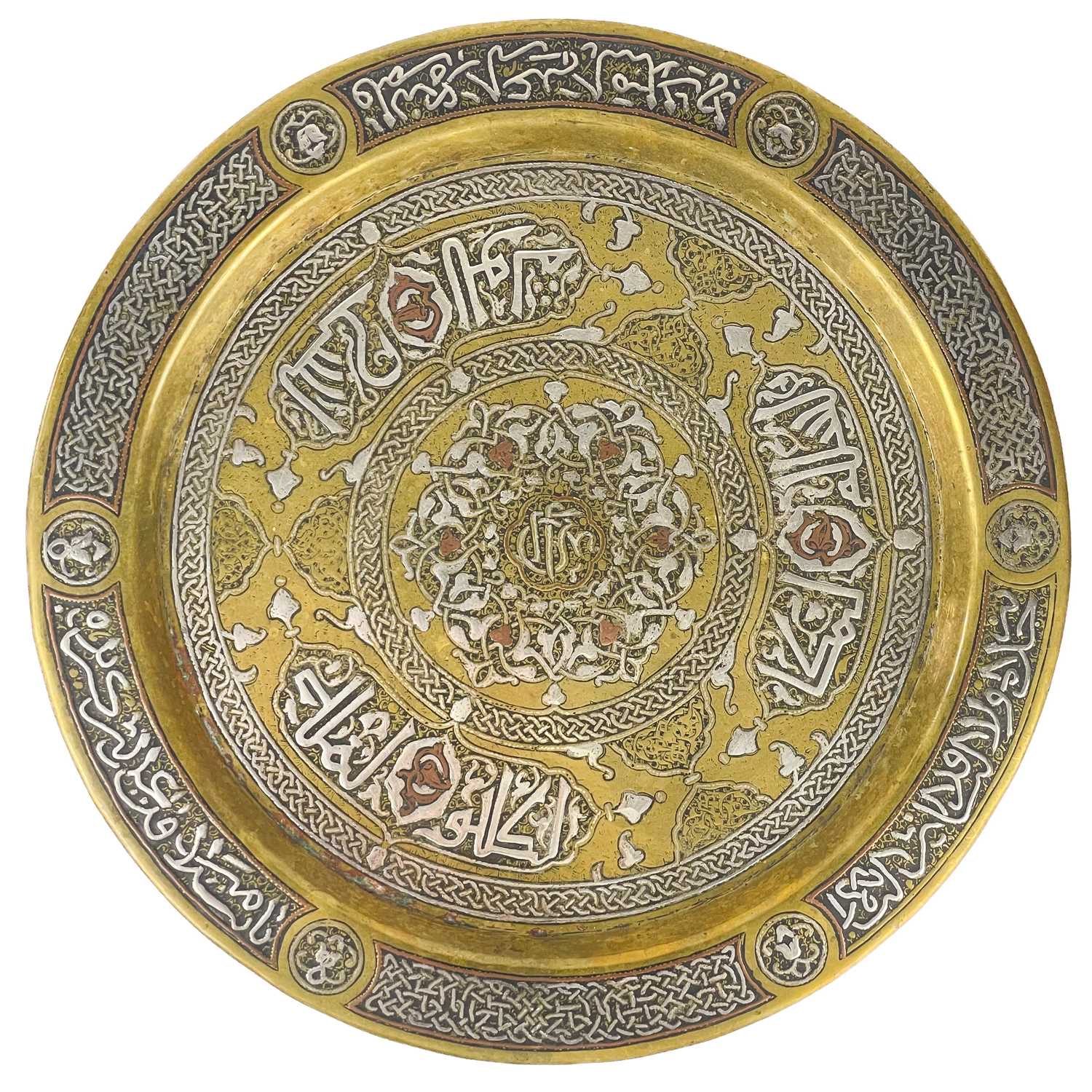 Lot 220 - A Cairoware brass and silver inlaid dish,