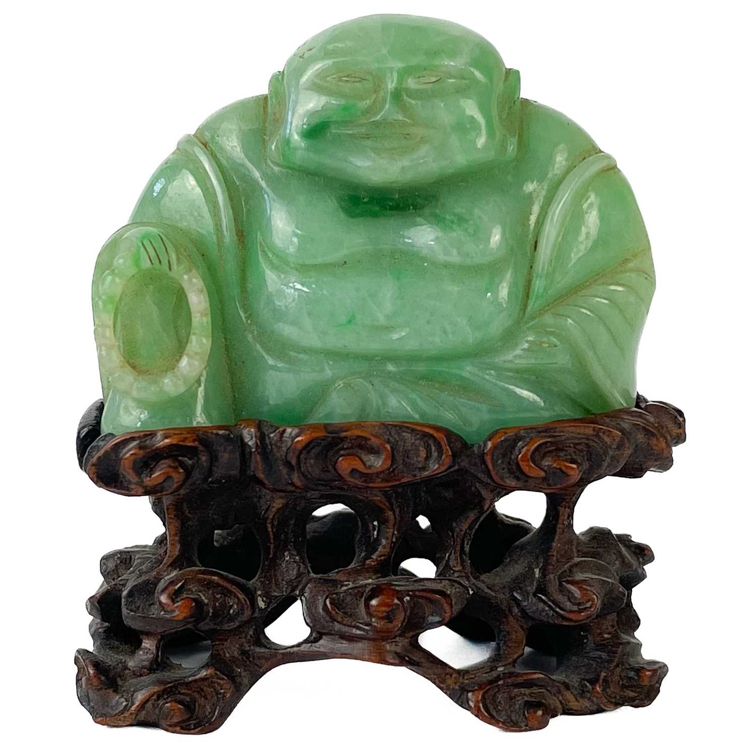 Lot 74 - A Chinese green jade small carving of a