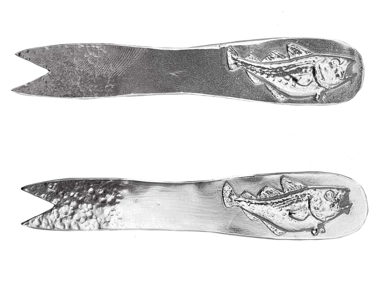 Lot 130 - A contemporary pair of .999 fine silver 'Cod'