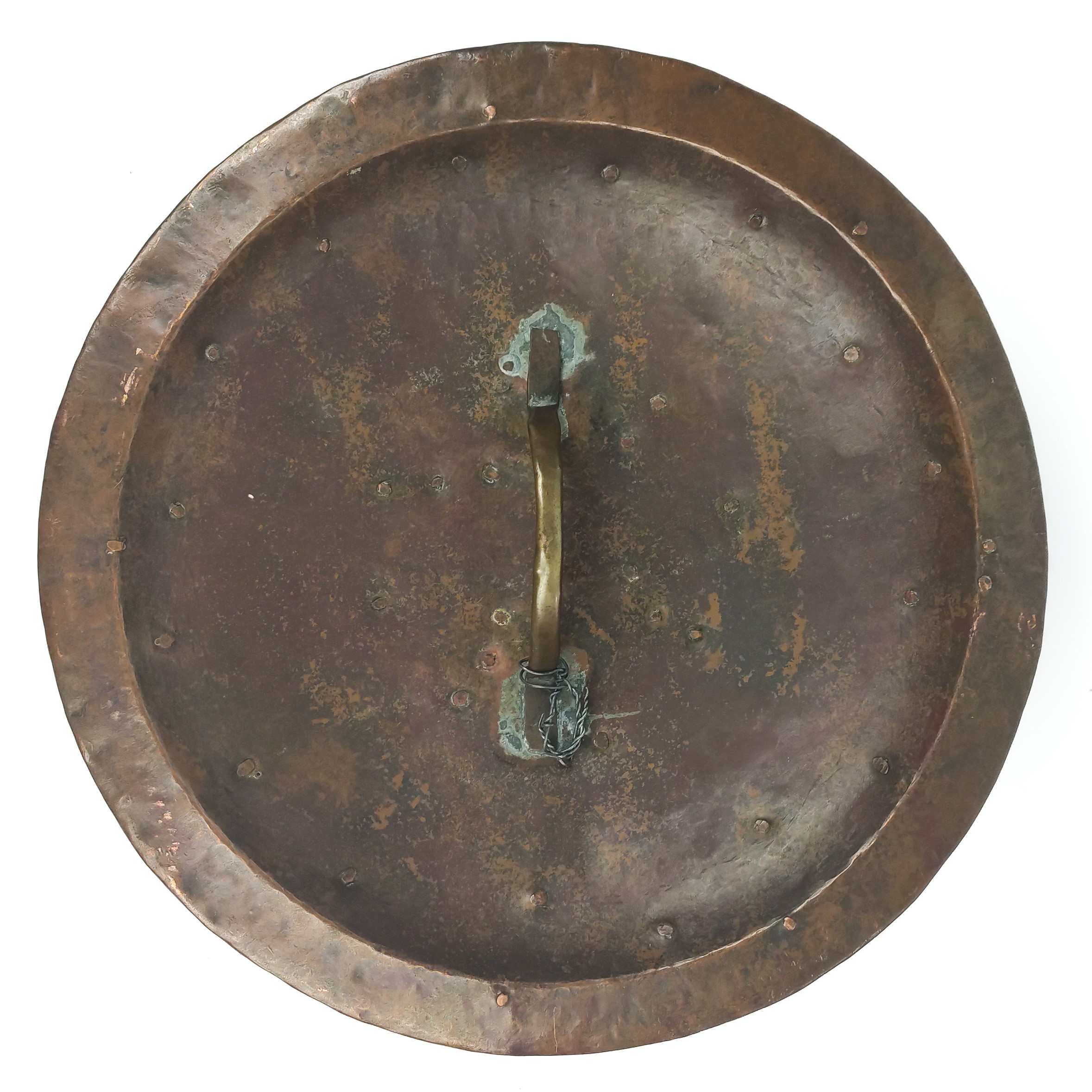 Lot 1118 - A Tibetan ceremonial copper shield, late