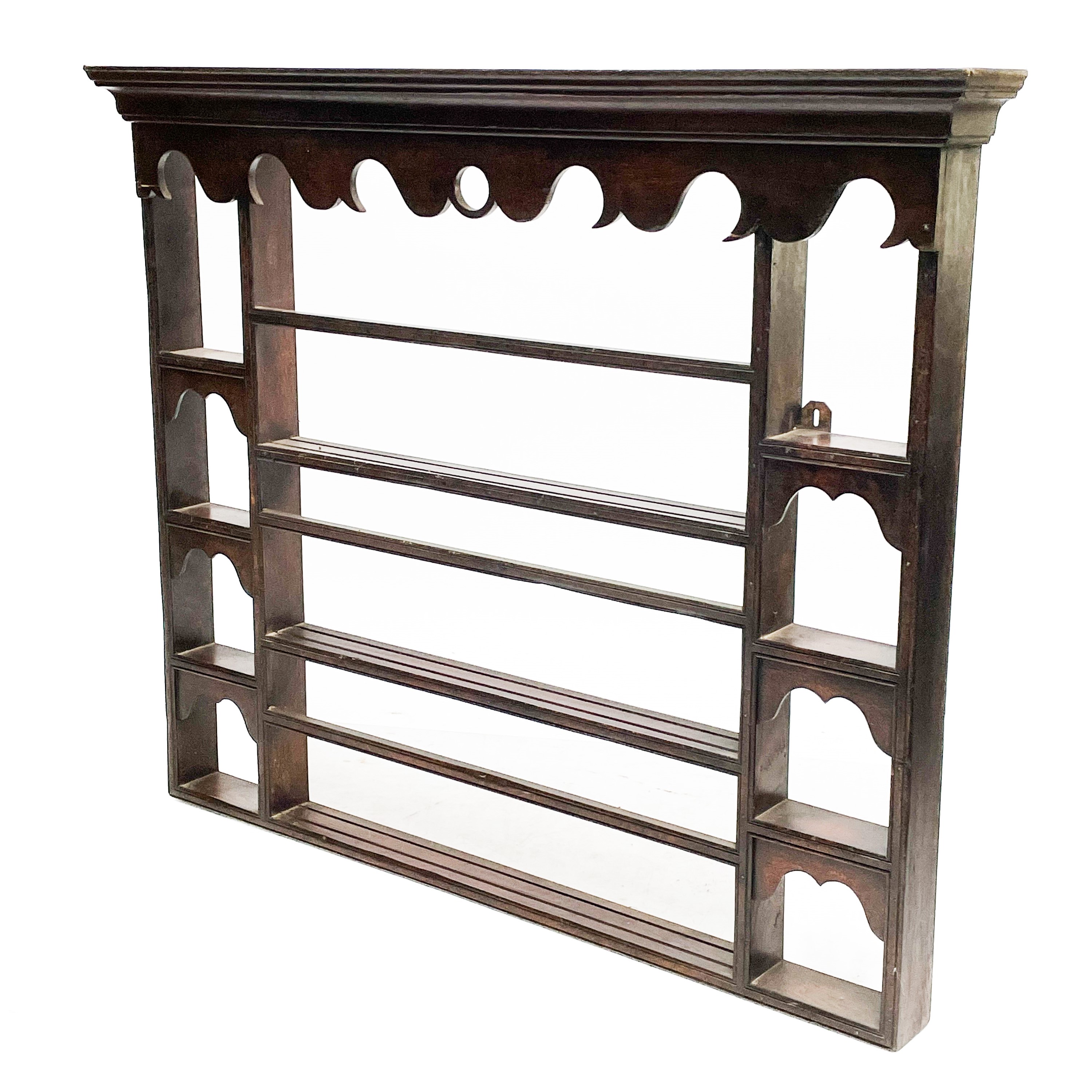Lot 234 - An oak delft rack.