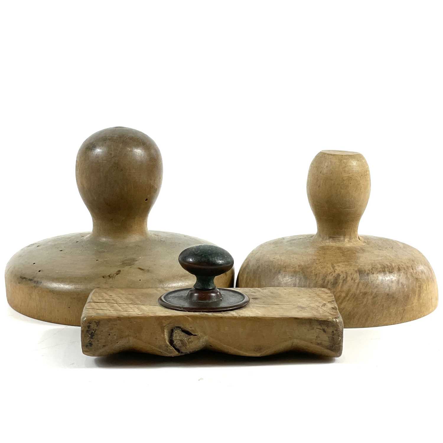 Lot 7 - Three treen butter stamps.