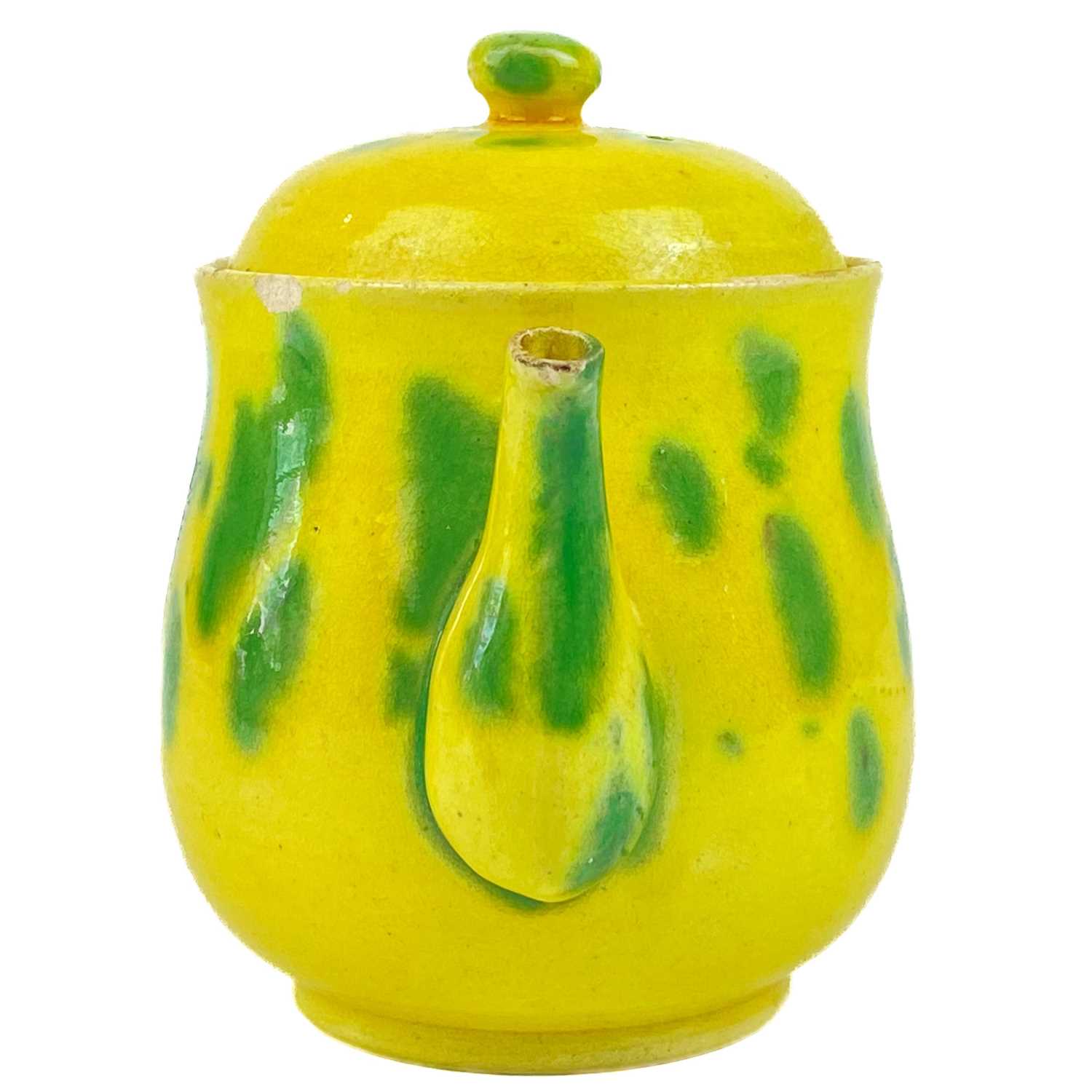 Lot 1428 - A Japanese yellow glazed teapot, circa 1900.