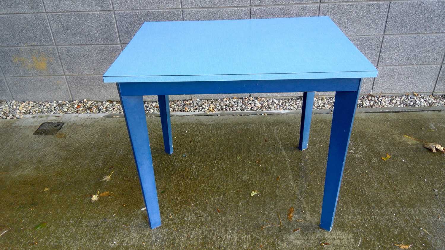 Lot 54 - A Formica top table. The Table measures 78cm