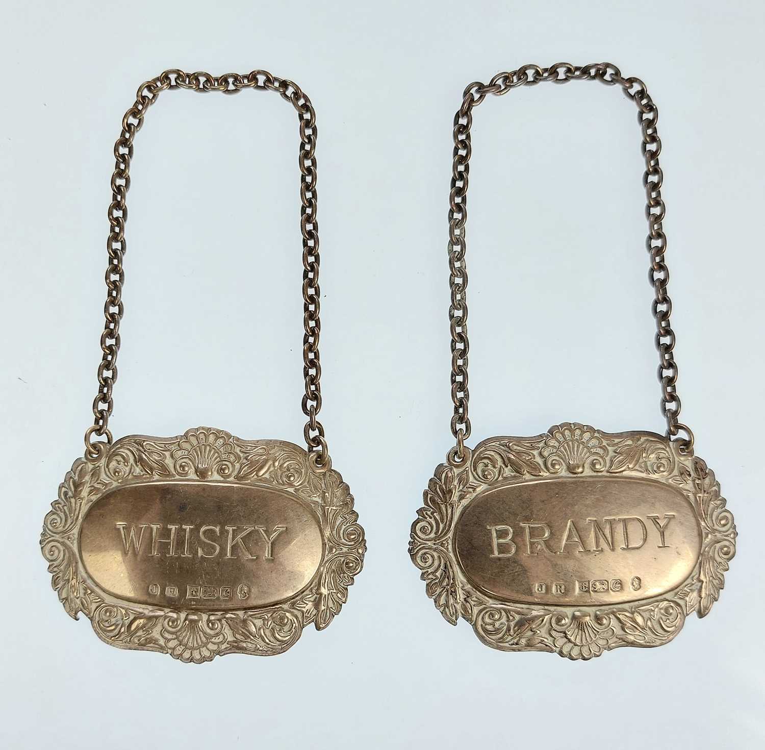 Lot 89 - A pair of modern silver spirit labels by John