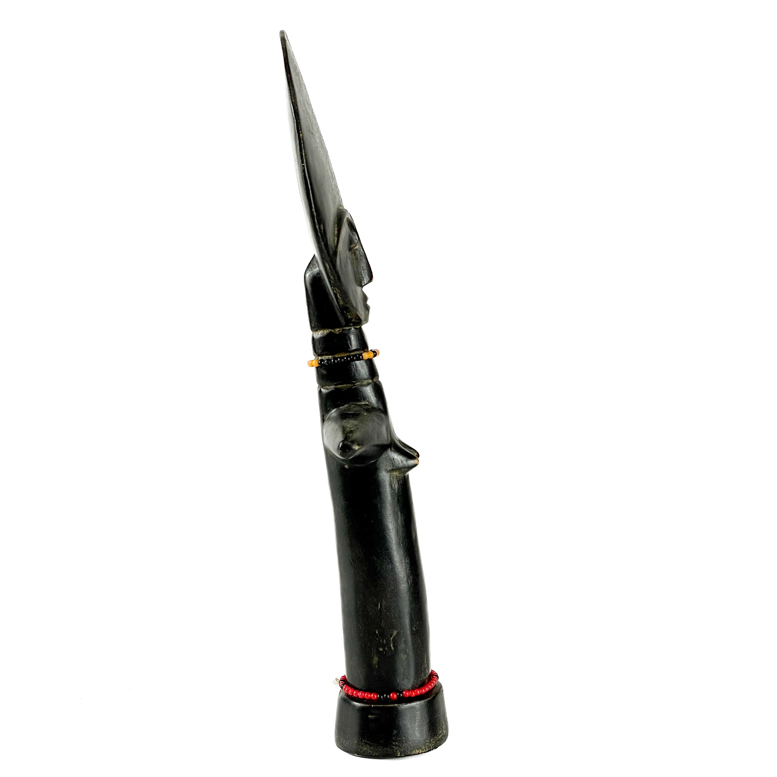 Lot 126 - An Ashanti Akua'ba fertility doll.