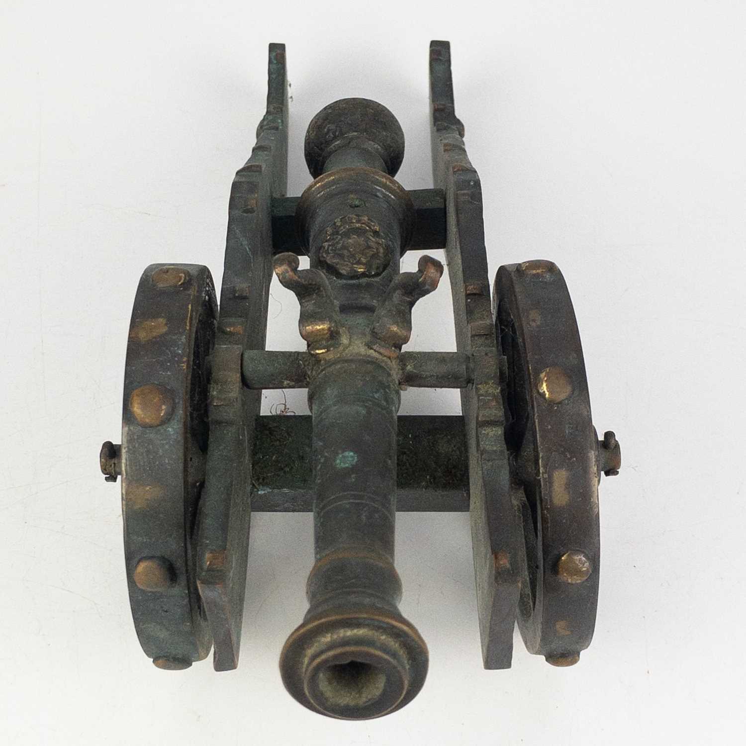 Lot 136 - A bronze table cannon cast in the 17th