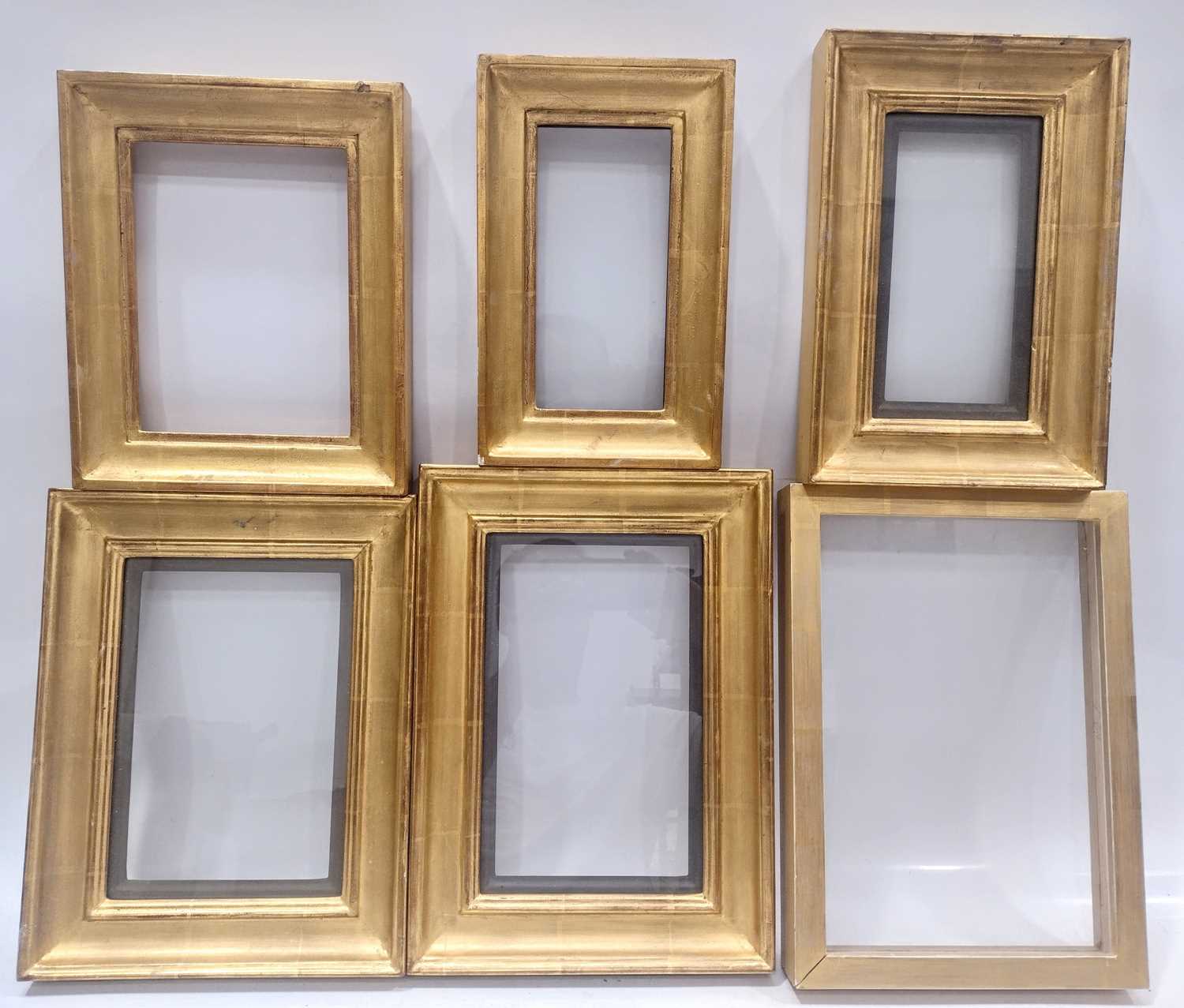 Lot 294 - Six glazed gilt picture frames of composite