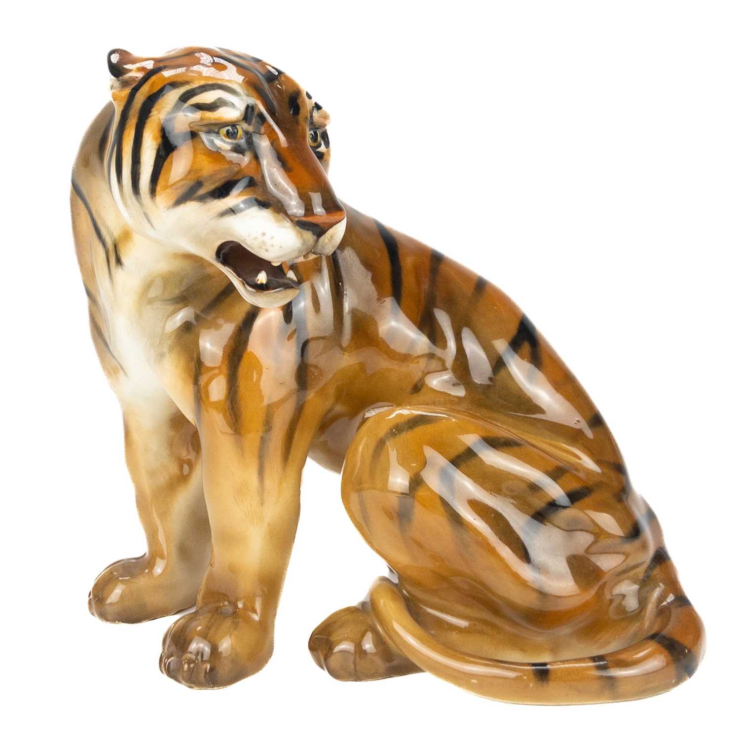 Lot 596 - A Royal Doulton figure of a seated tiger HN