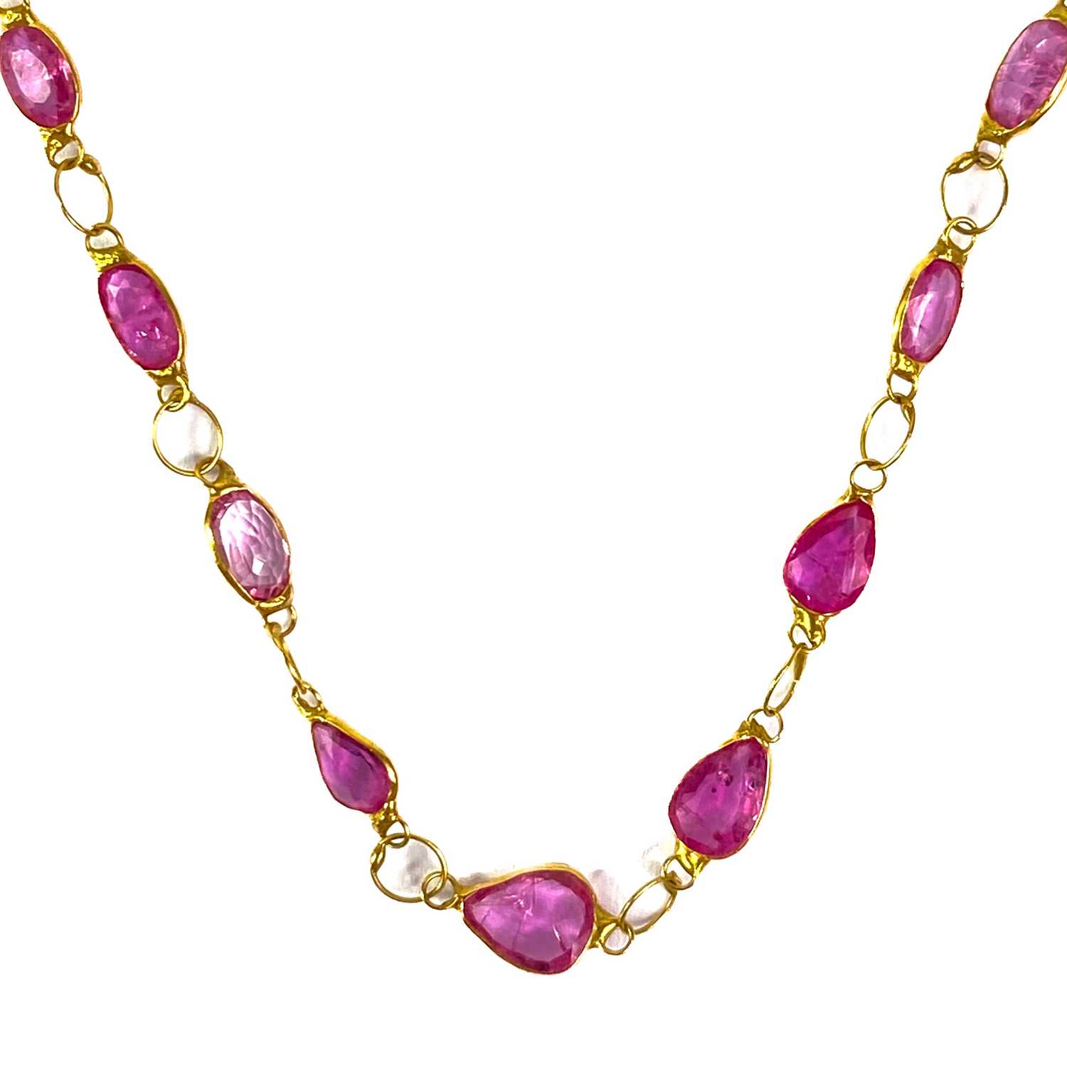 Lot 164 - A 14ct gold ruby spectacle set necklace.