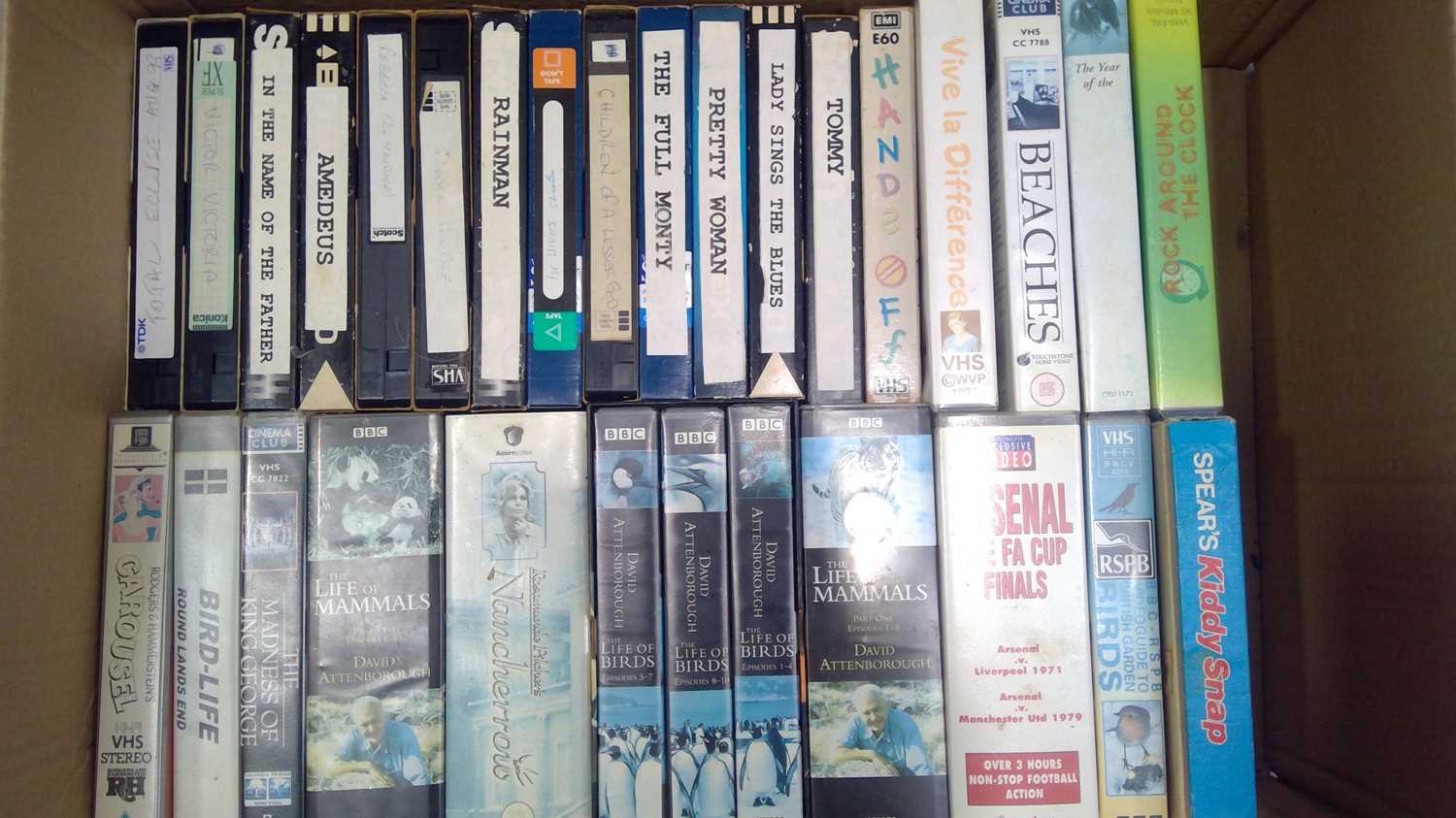 Lot 106 - A Box of VHS Tapes. Some are pre-recorded