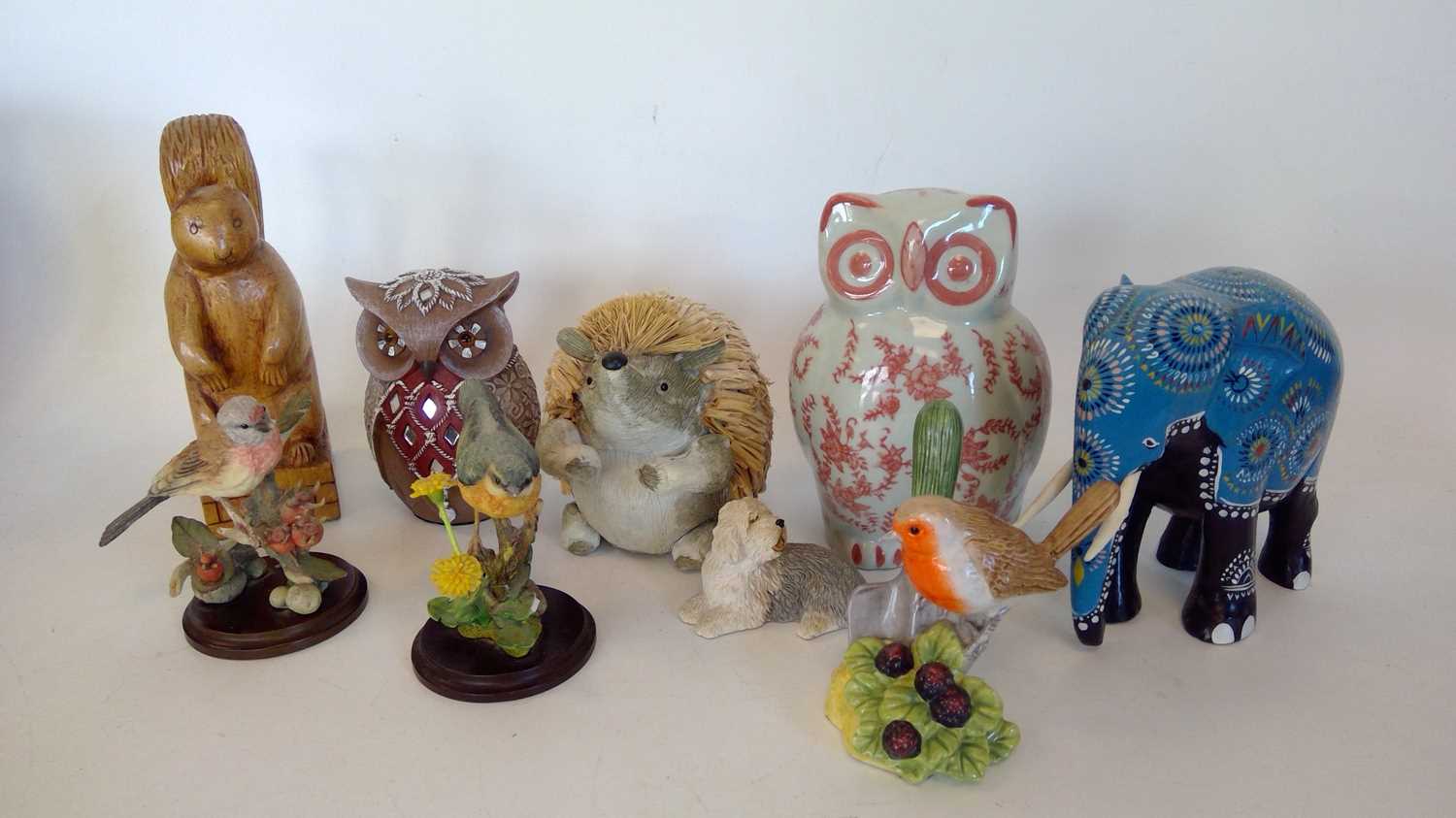 Lot 65 - A Beswick robin figure, with a menagerie of