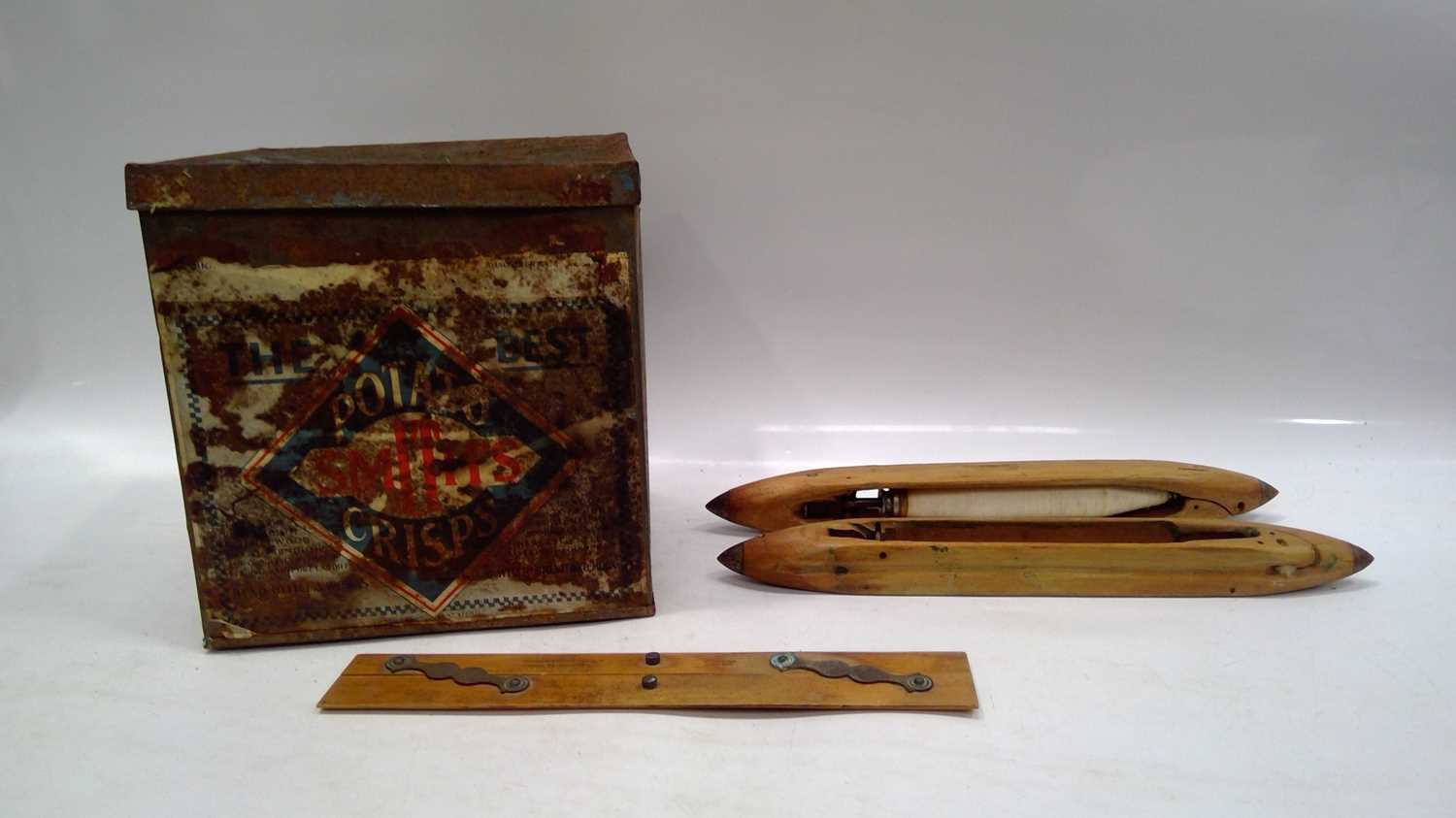 Lot 34 - Two wooden textile shuttles - one with thread,
