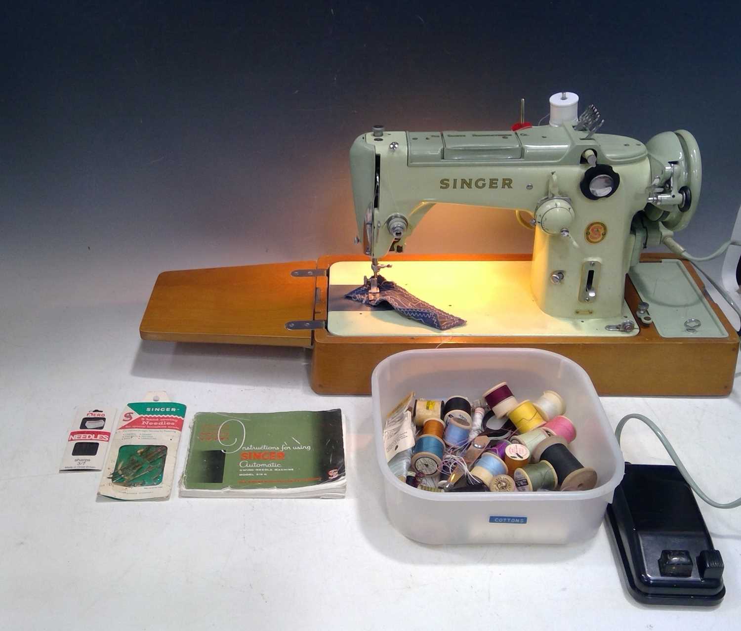 Lot 219 - A Mid- Century, Singer Sewing Machine. The