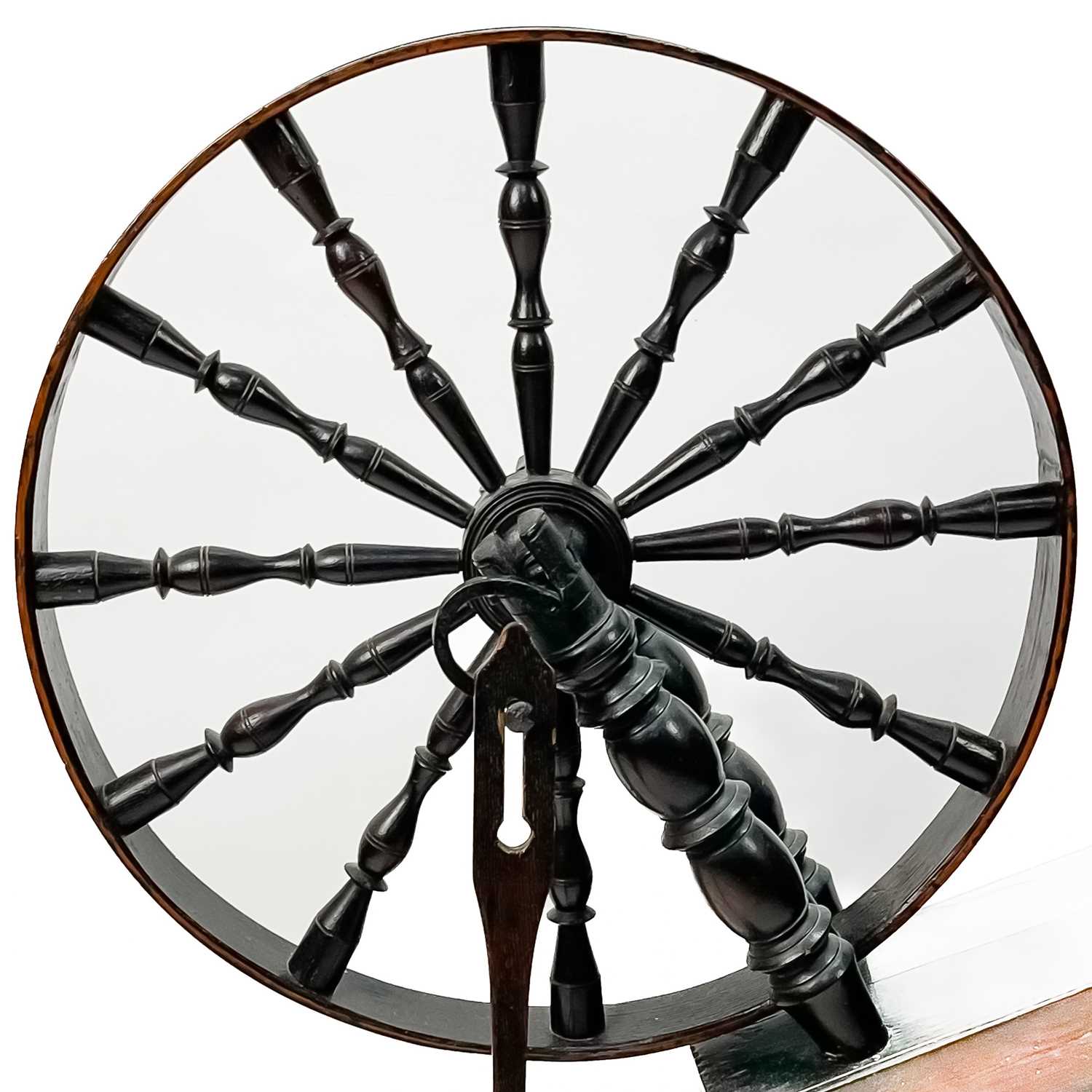 Lot 101 - An oak spinning wheel.