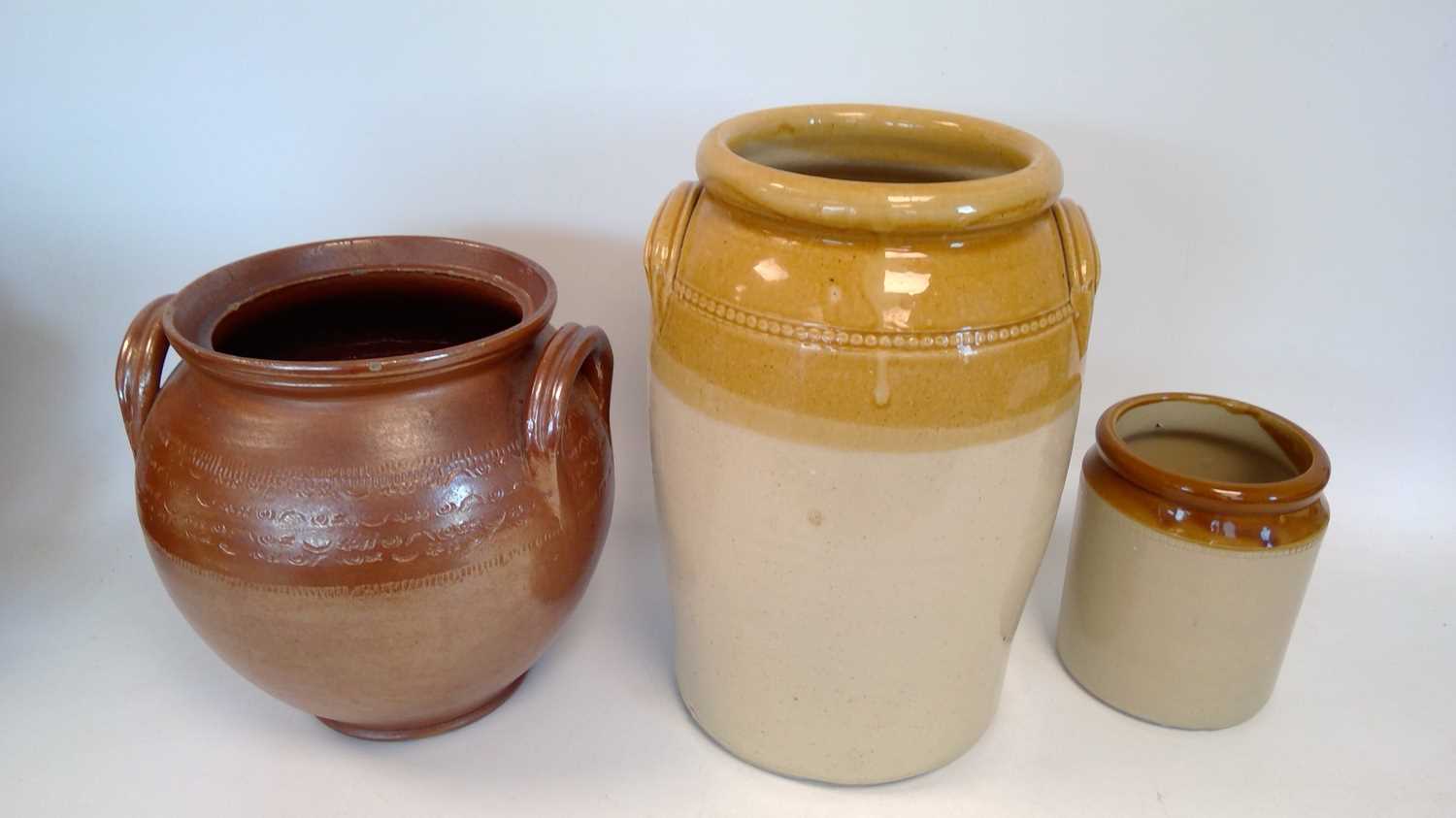 Lot 145 - Three stoneware pots, the tallest measures