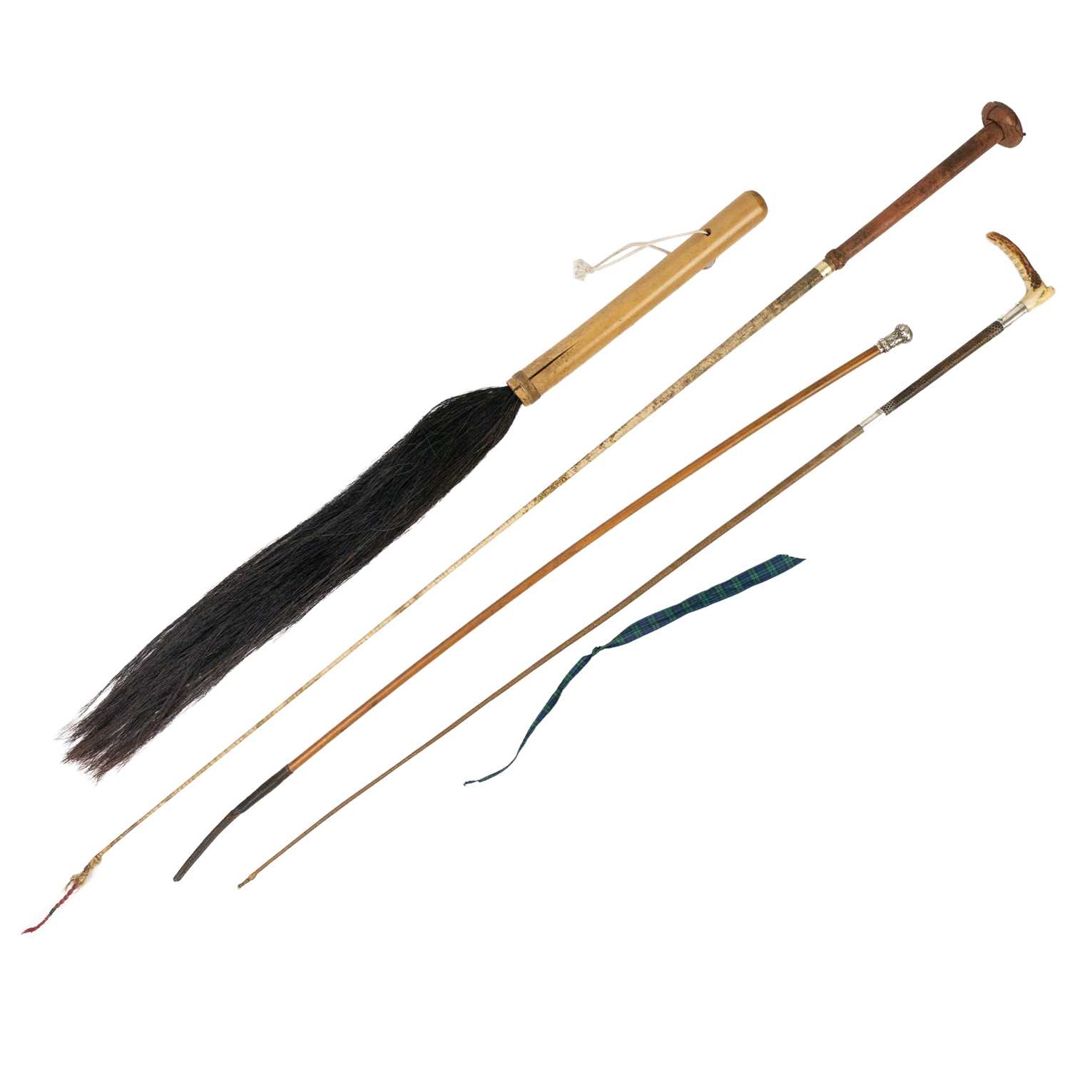 Lot 257 - A riding whip with applied silver mounts and