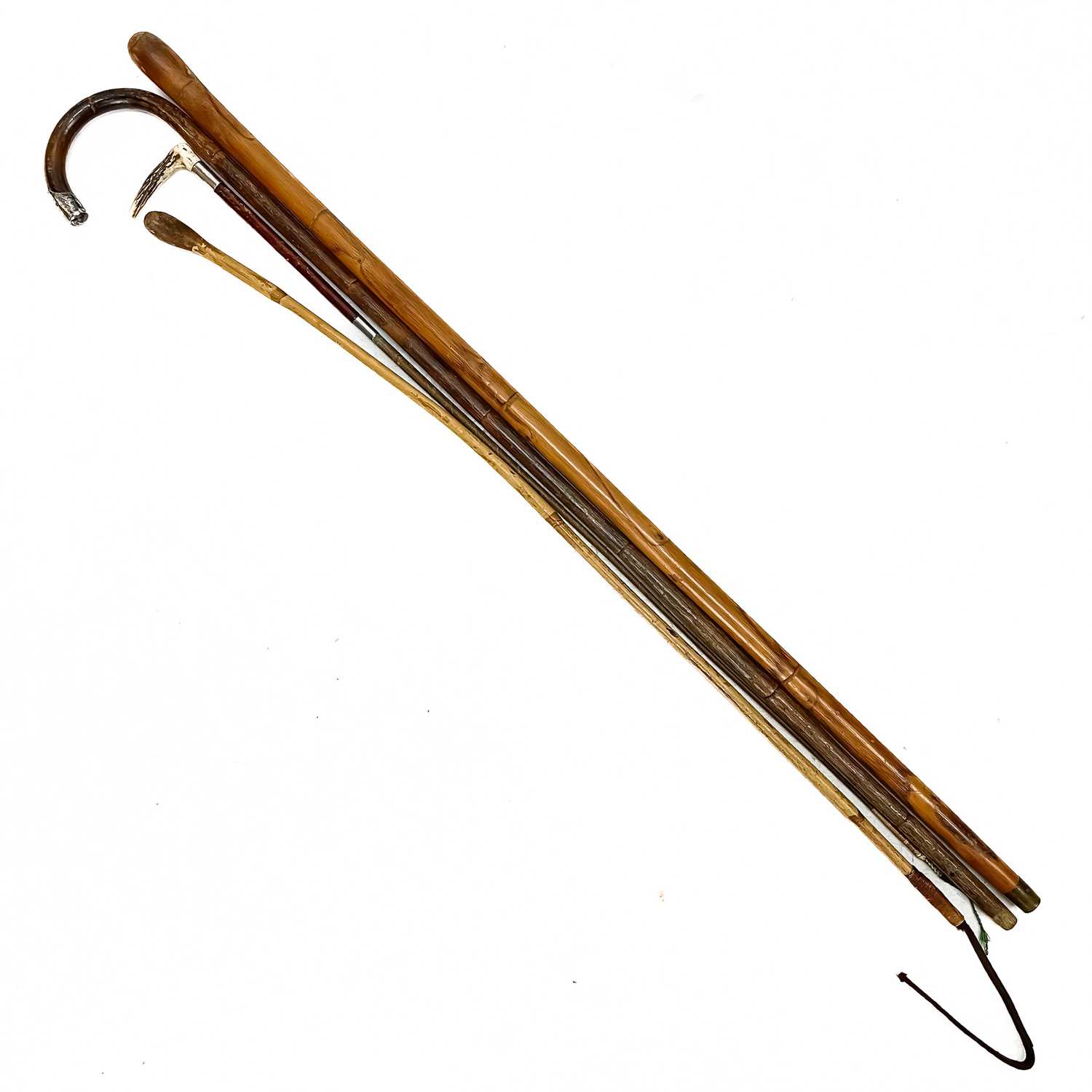 Lot 99 - A white metal mounted child's riding crop