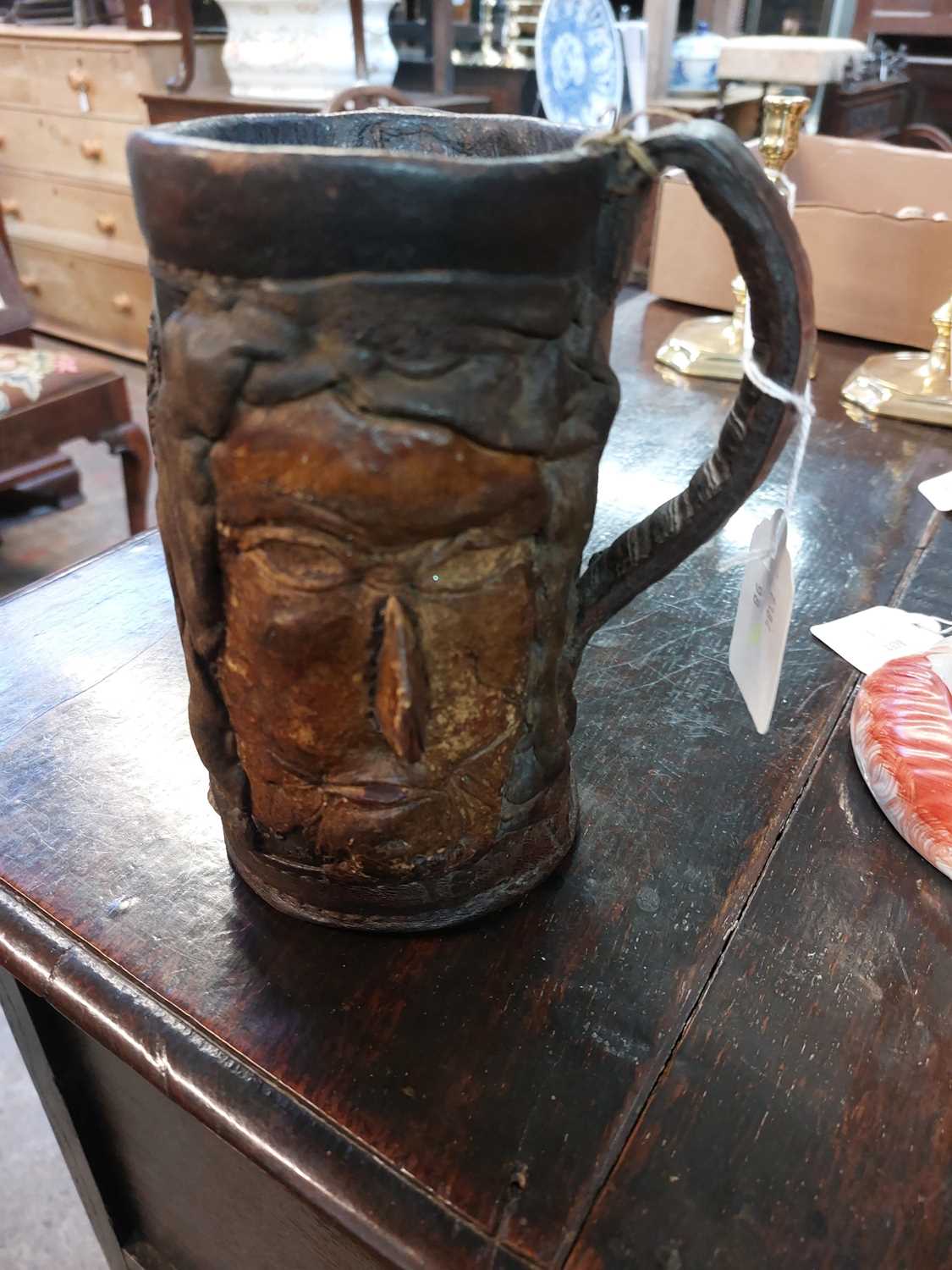 Lot 182 - An early 20th century folk art leather twin