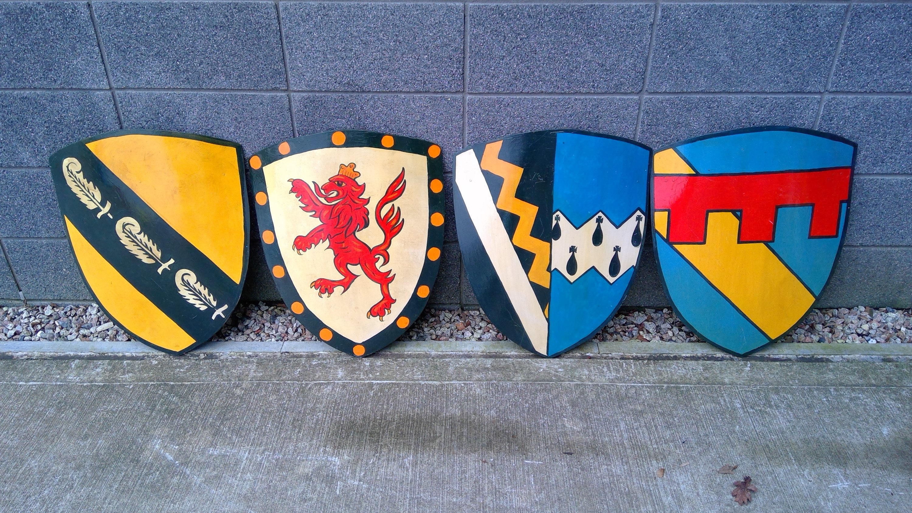 Lot 75 - Four Hand-Painted Decorative Shields from St