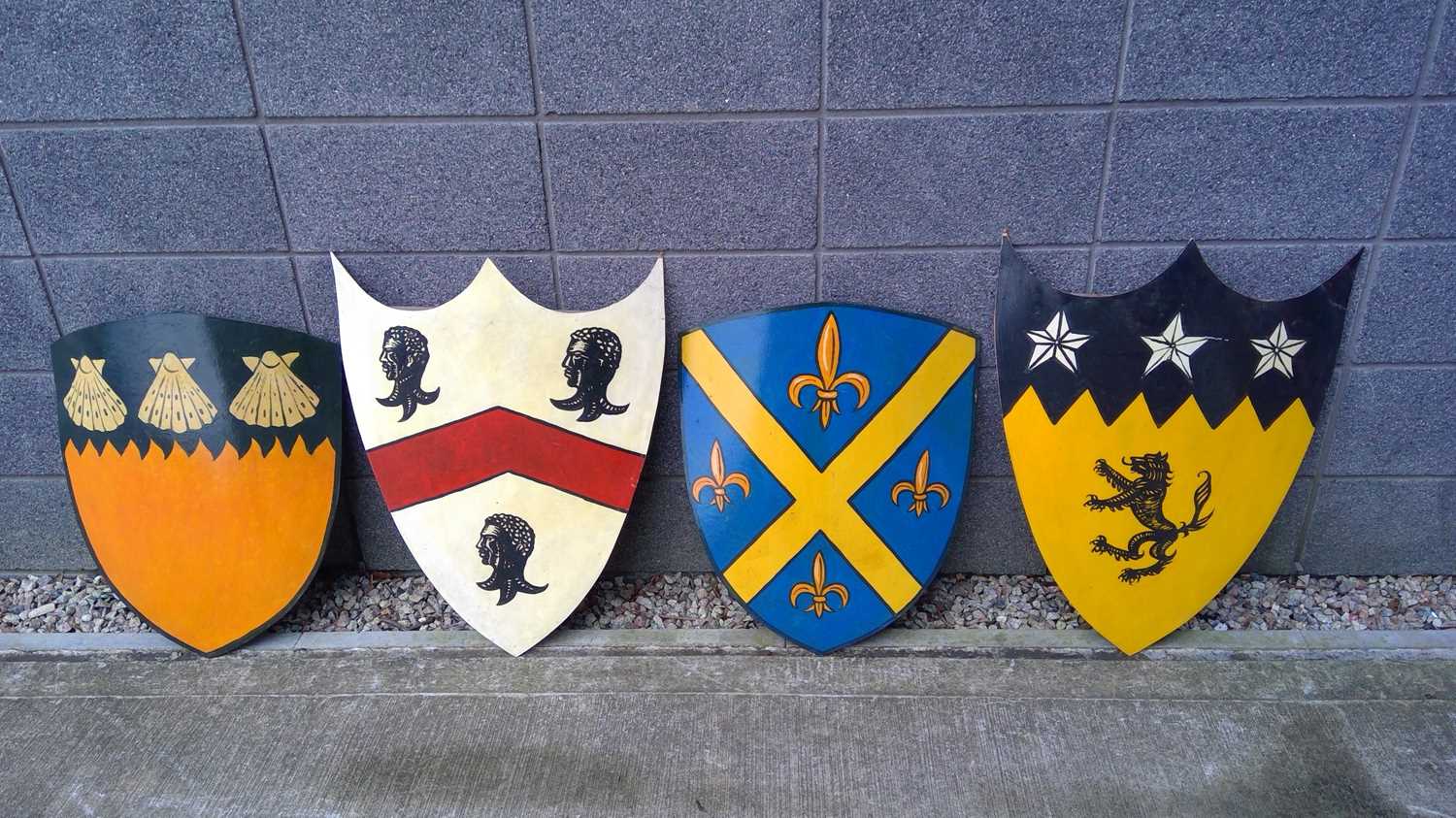 Lot 74 - Four Hand-Painted Decorative Shields from St