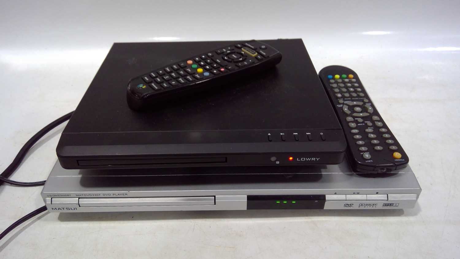 Lot 82 - A Matsui DVD player and a Lowry DVD player.