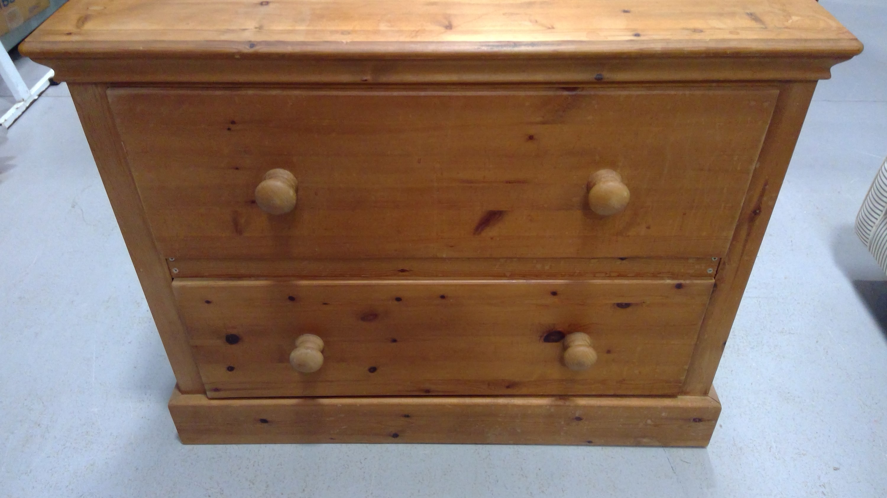Lot 101 - A Two Drawer, Chest of Drawers. The Chest