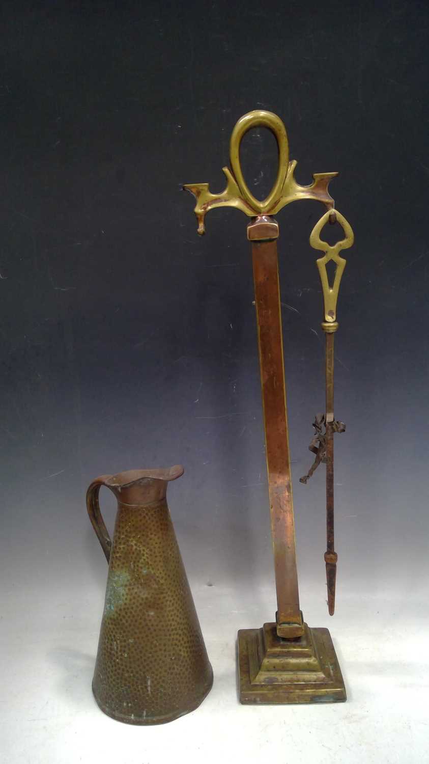 Lot 167 - A Copper Fire Companion and a Copper Jug.