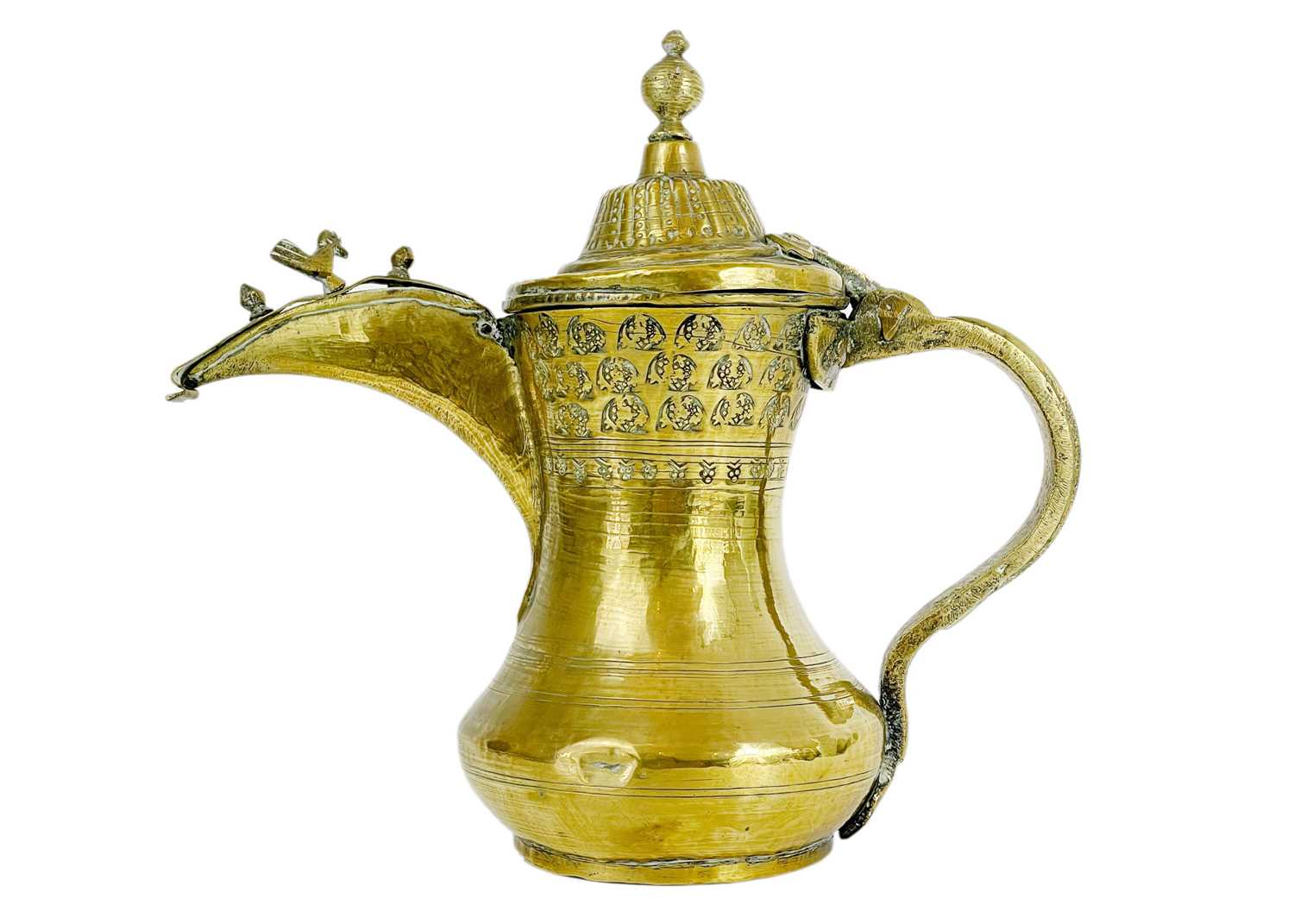 Lot 69 - A Saudi Arabian brass dallah pot, 19th