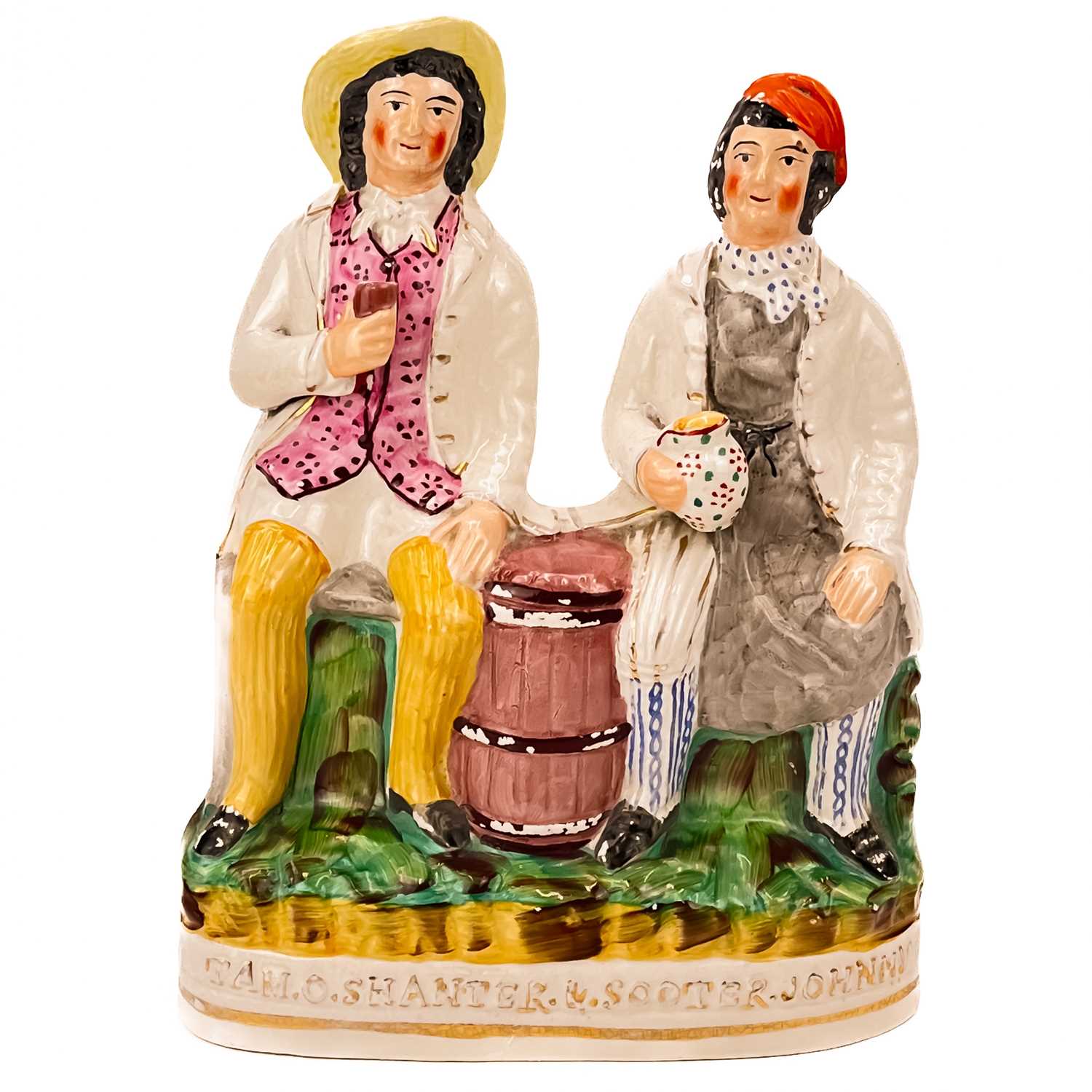 Lot 402 - A Staffordshire pottery bocage figure of a