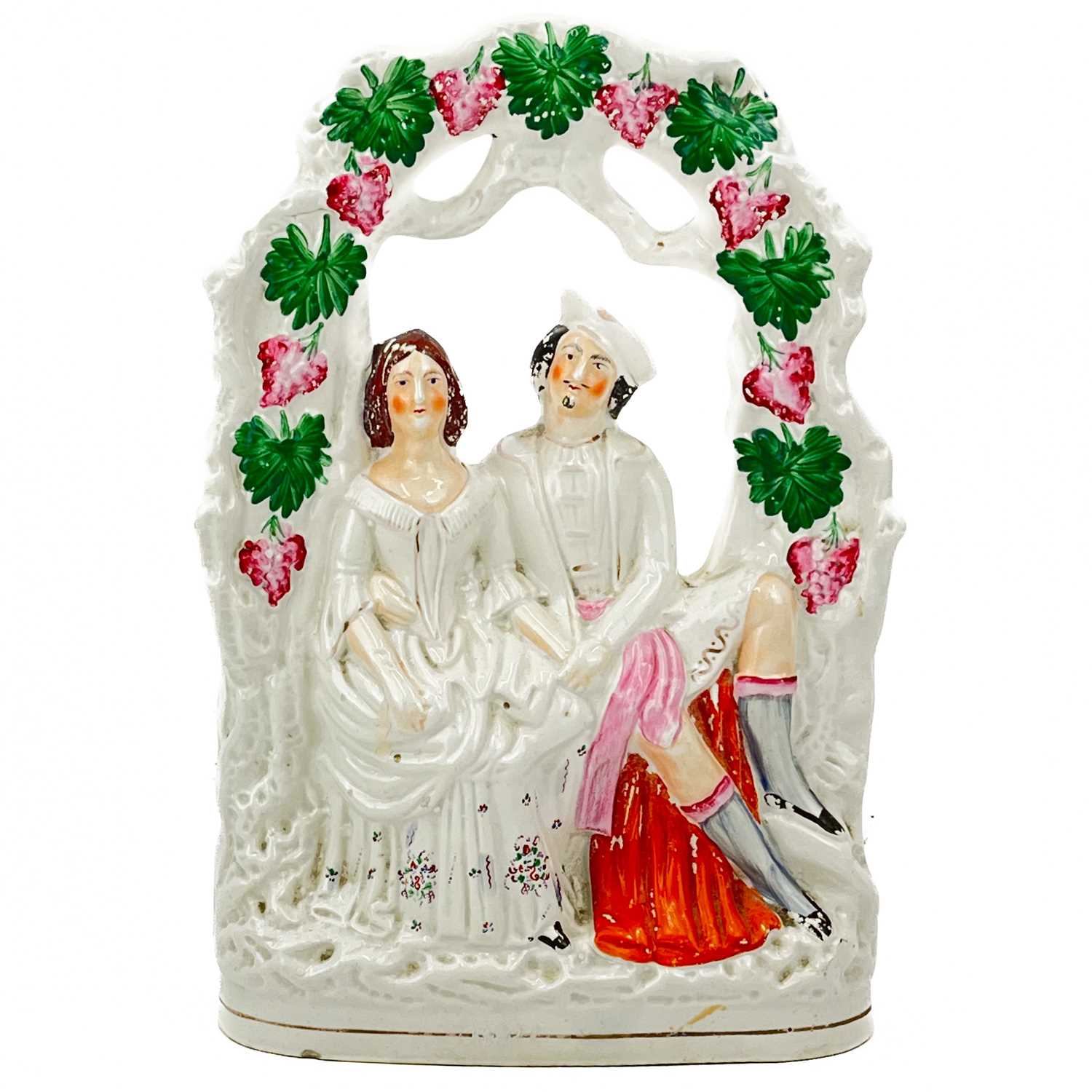 Lot 402 - A Staffordshire pottery bocage figure of a