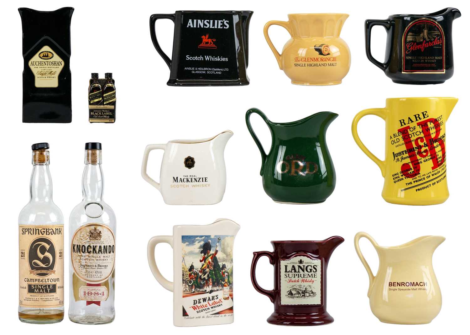Lot 74 - A collection of ten ceramic whisky jugs.