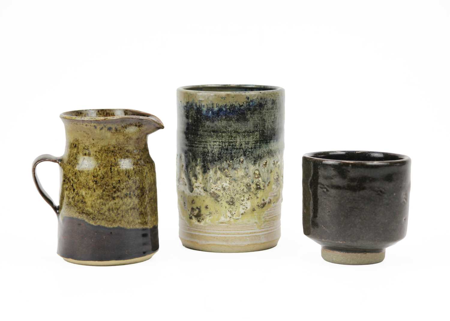 Lot 185 - A studio pottery circular vase.