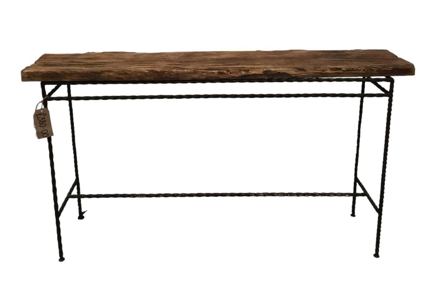 Lot 5 - A rustic wooden console table with a twisted