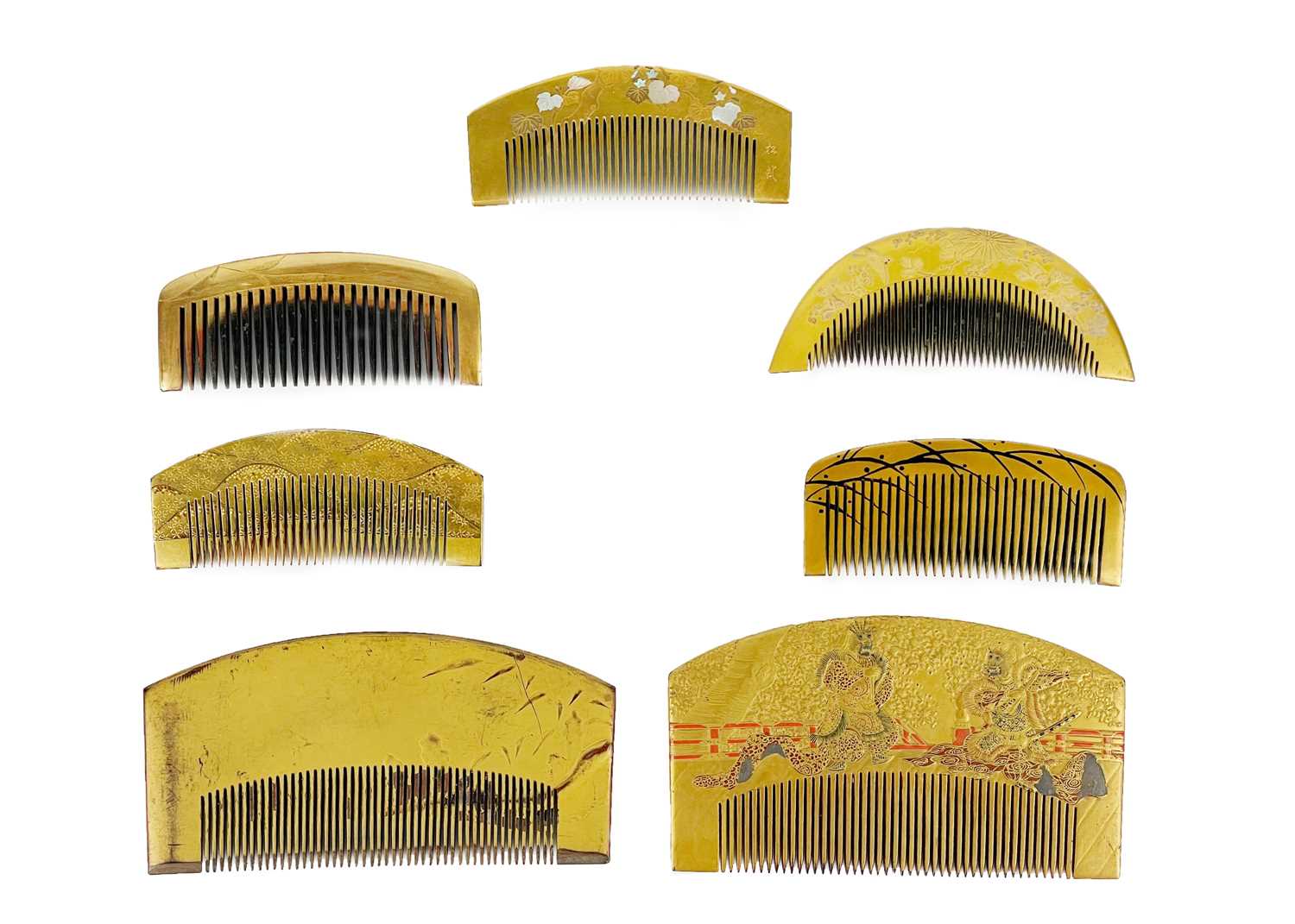 Lot 412 - Two large Japanese gold lacquer combs, Edo