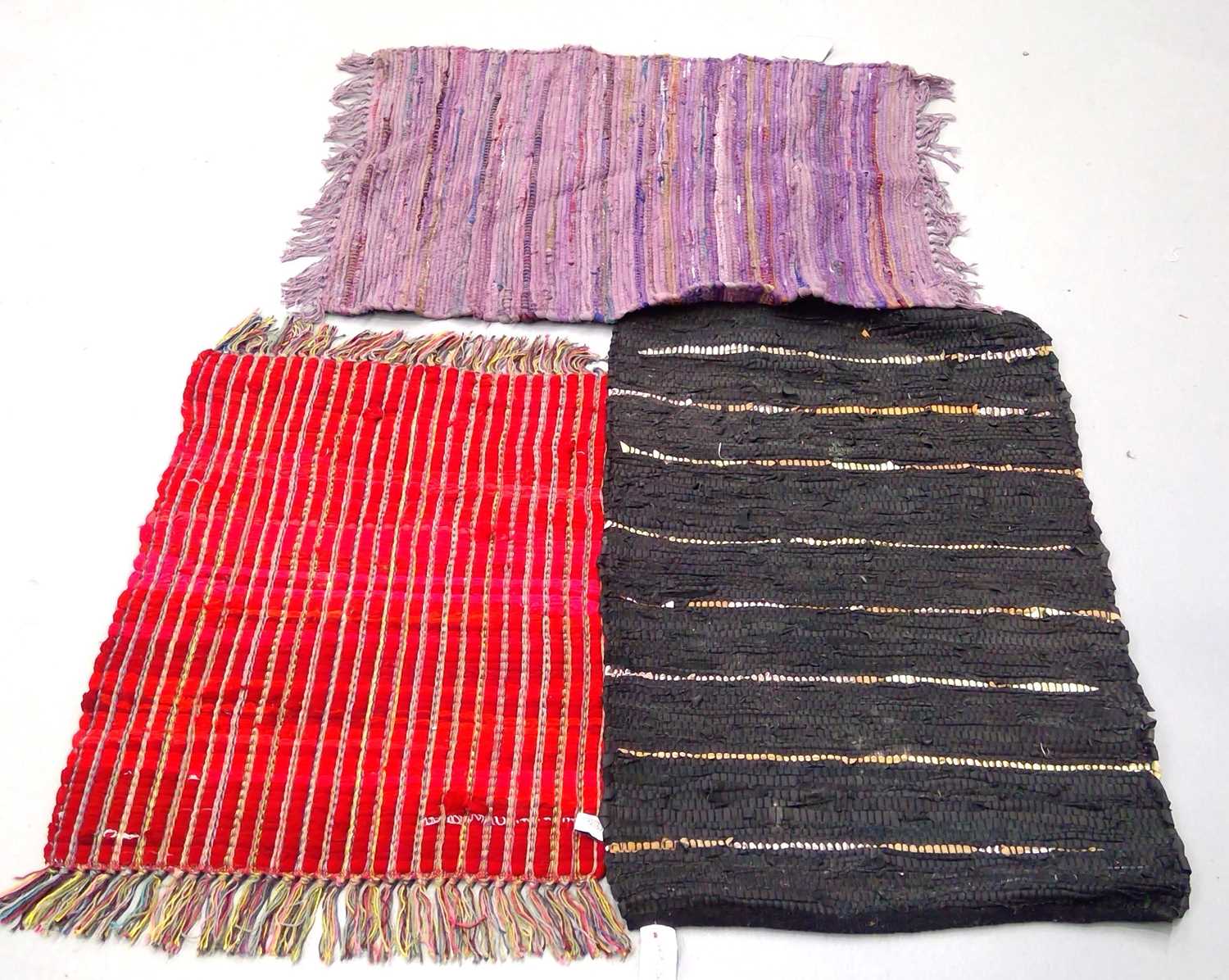 Lot 366 - Three small Indian rag rugs the largest of