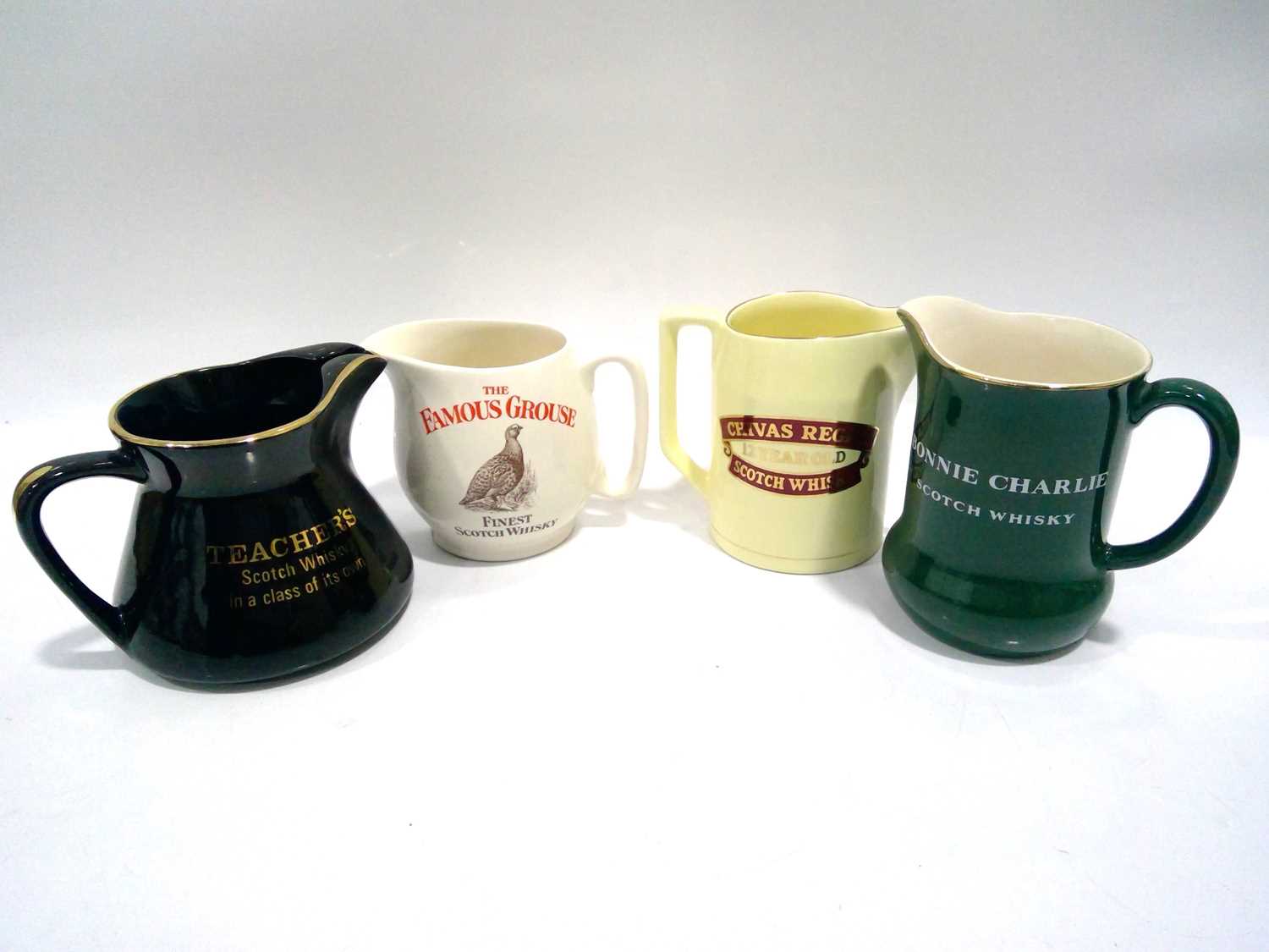 Lot 27 - Four Wade water jugs were commissioned by