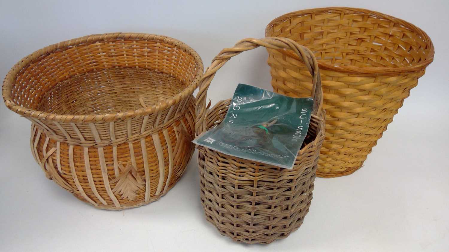 Lot 62 - Three woven baskets and a pair of Bonsai
