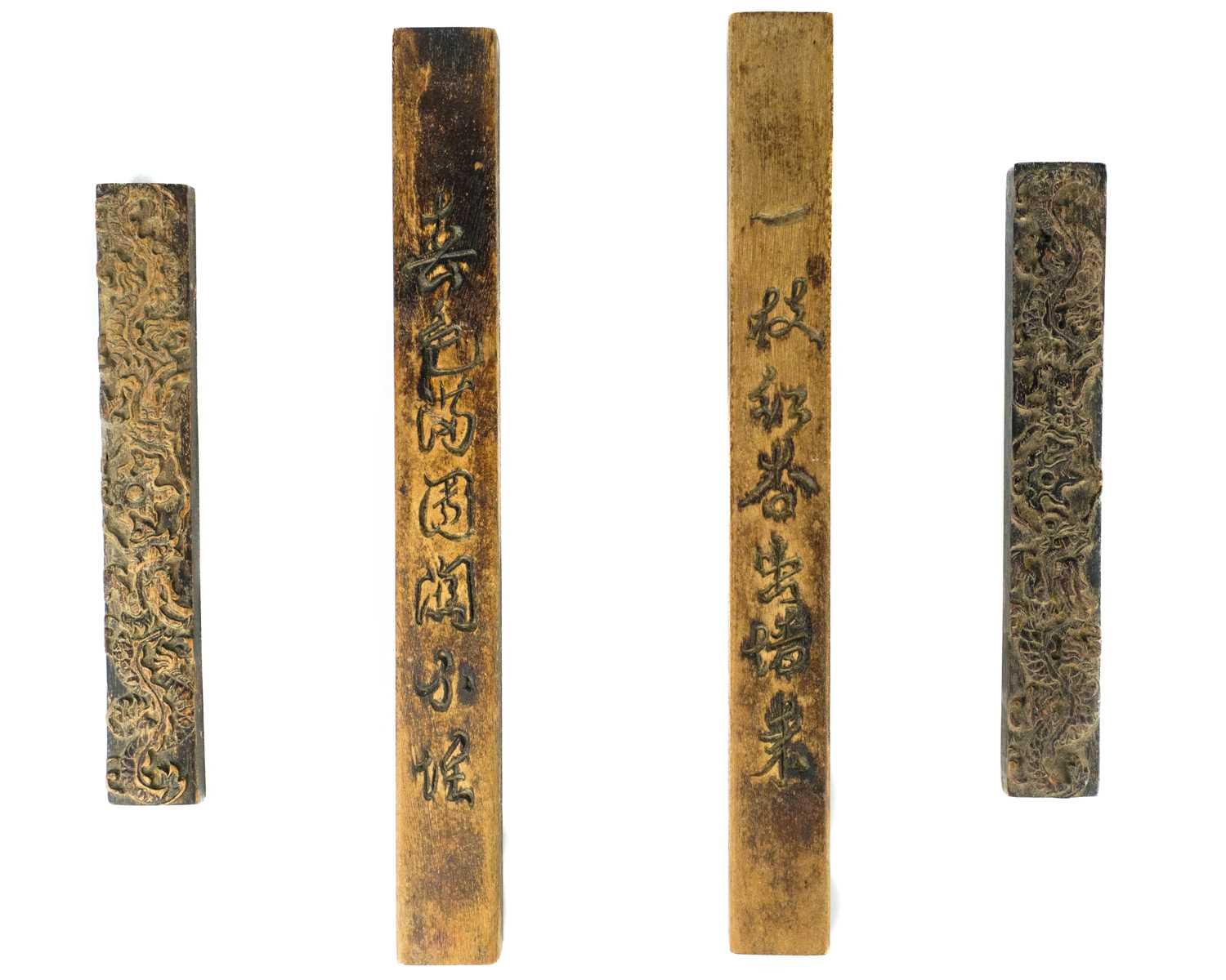 Lot 574 - Two pairs of Chinese carved wood ink blocks,