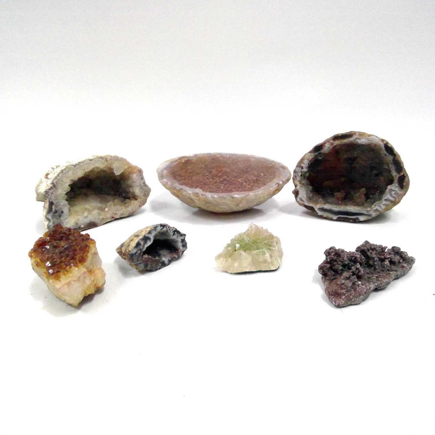 Lot 155 - Four small quartz geode crystals the largest