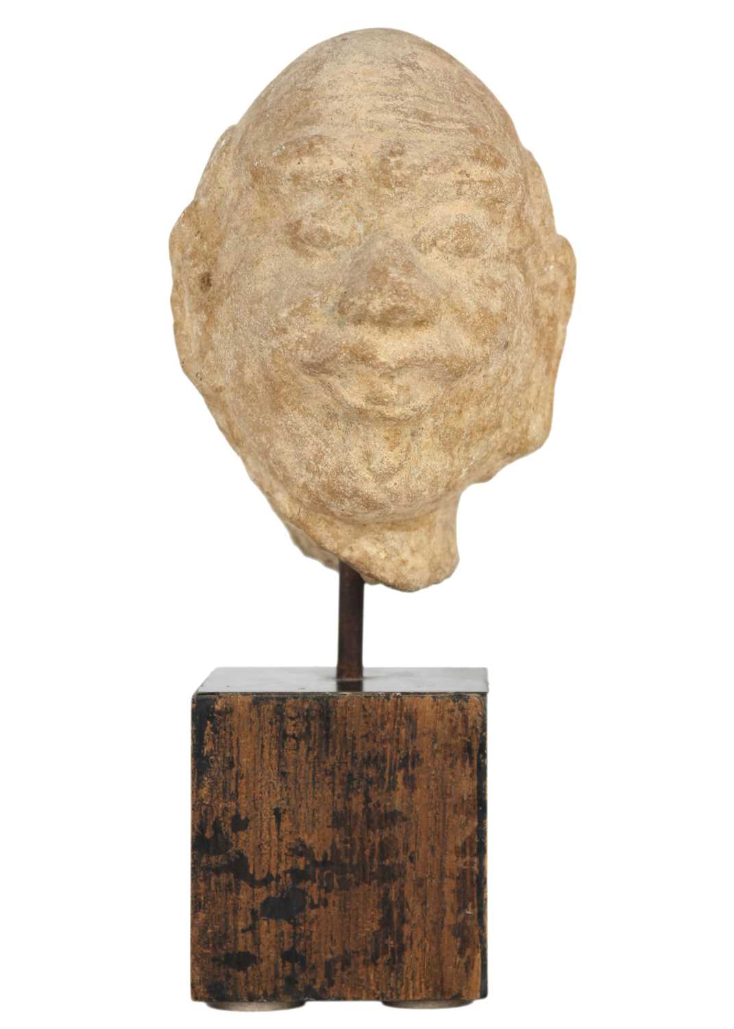 Lot 659 - A Chinese ancient carved stone head of a man.