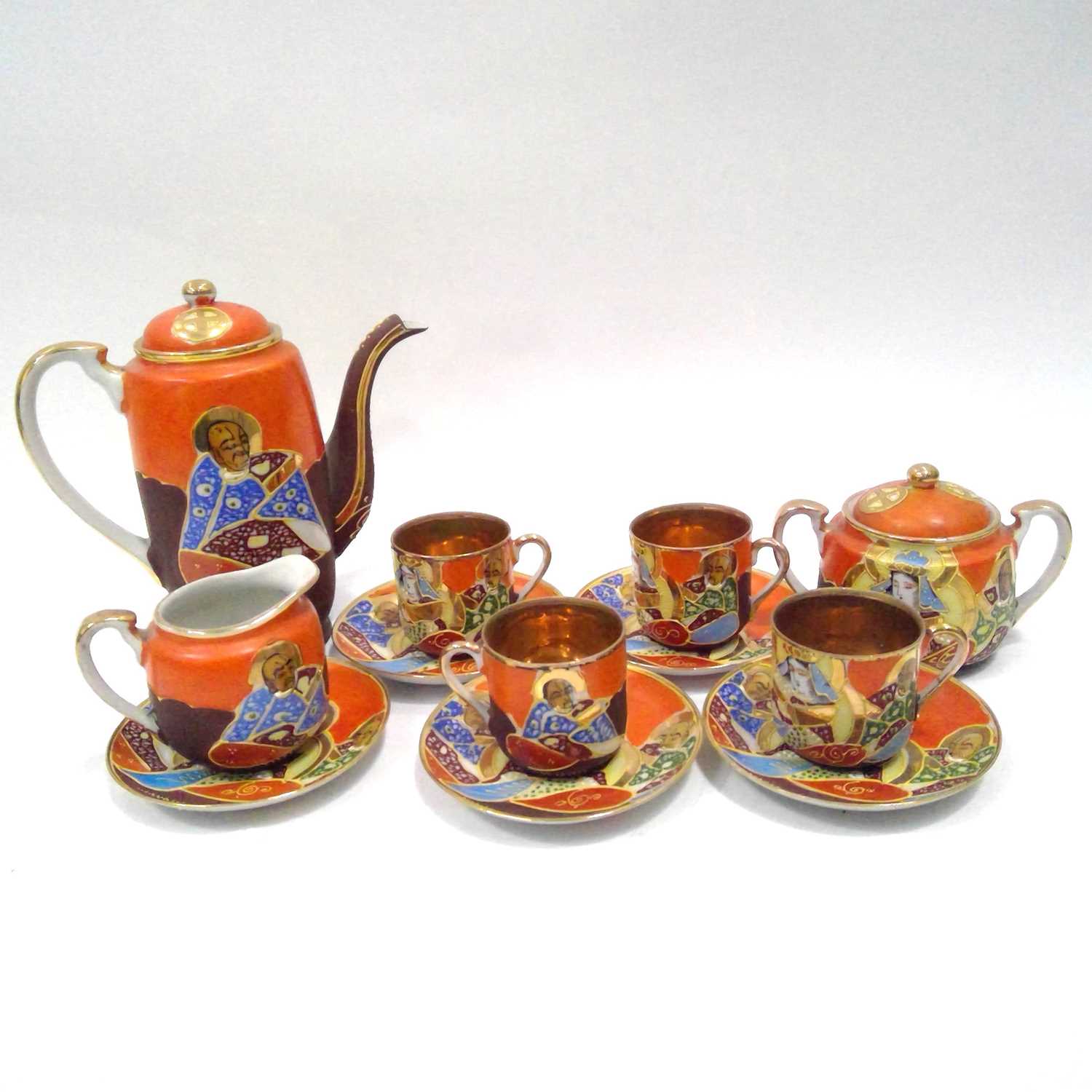 Lot 269 - A four-piece Japanese coffee set, the pot