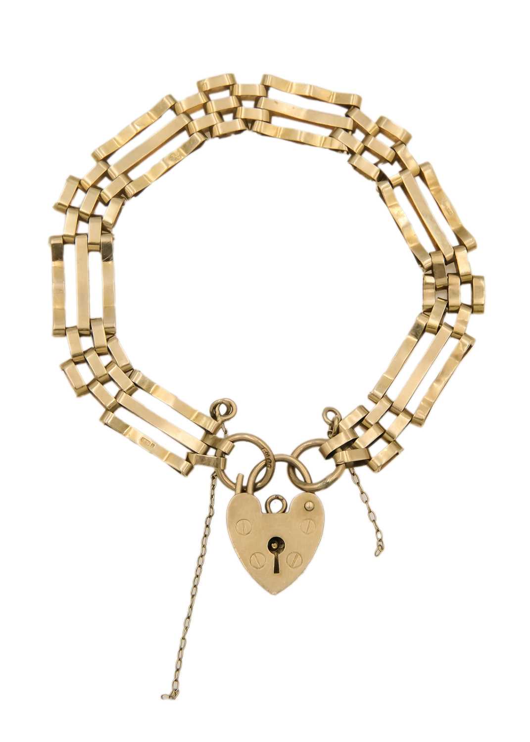 Lot 229 - A 9ct three bar gate link bracelet with