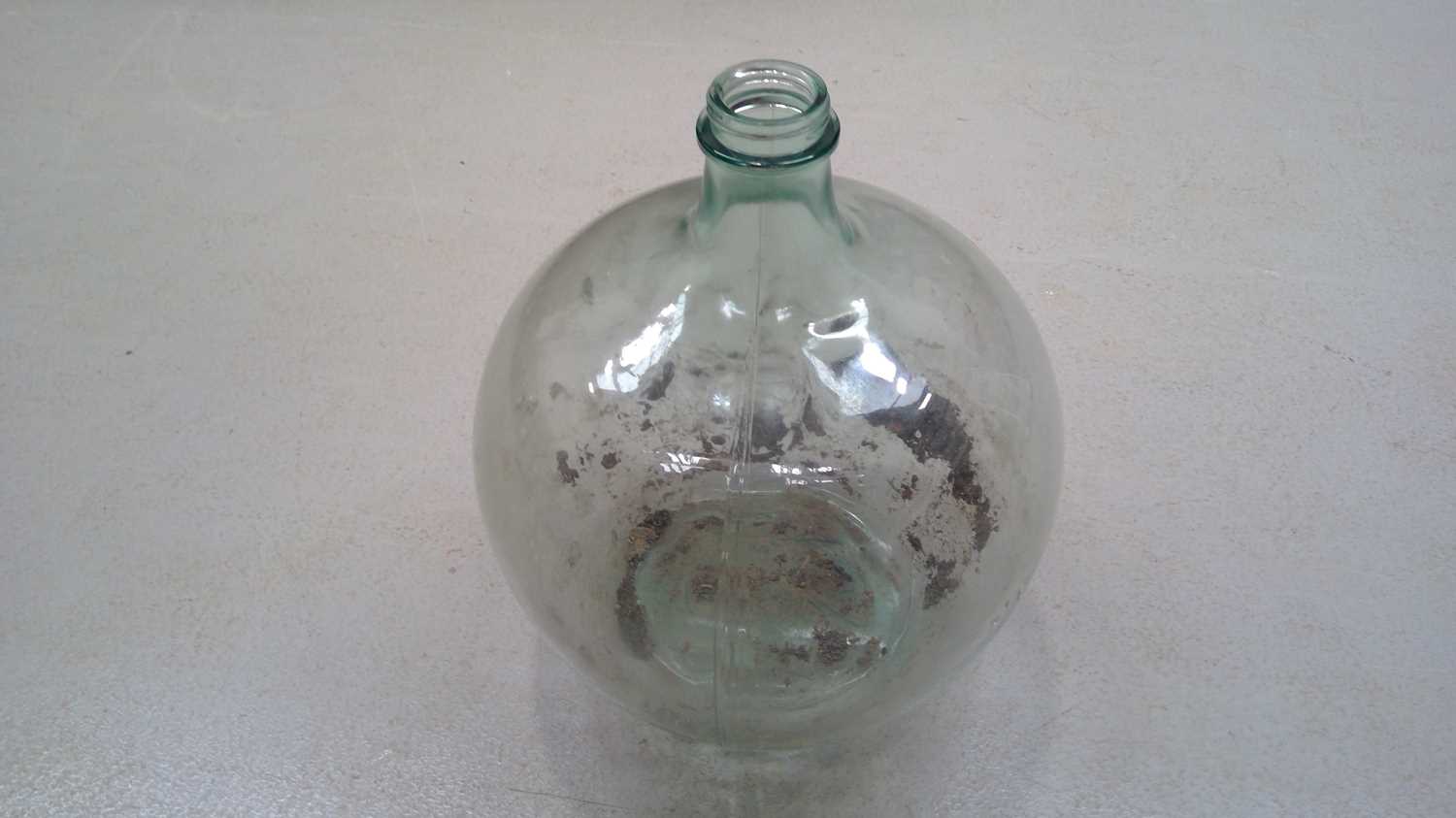 Lot 365 - A large glass carboy, 55cm tall.
